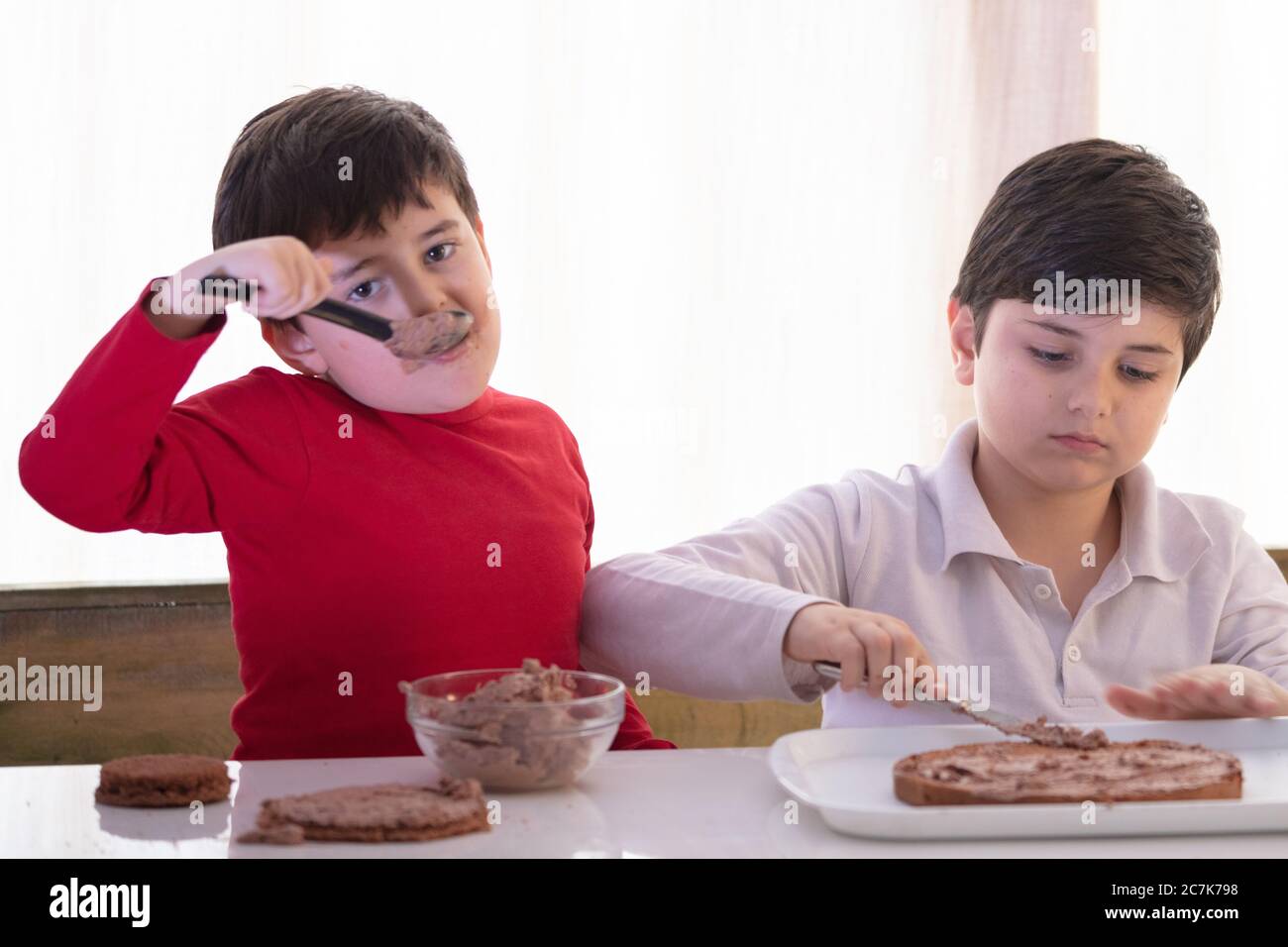 kids boy making cake bakery in kitchen Stock Photo - Alamy