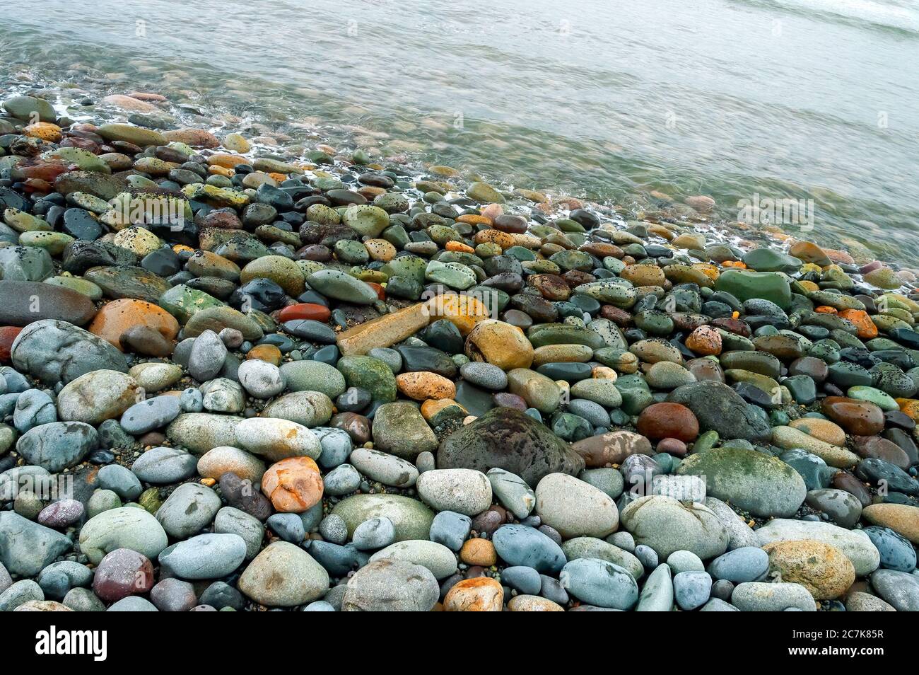 Closeup of colorful rounded rocks and ocean, Lima, Peru Stock Photo - Alamy