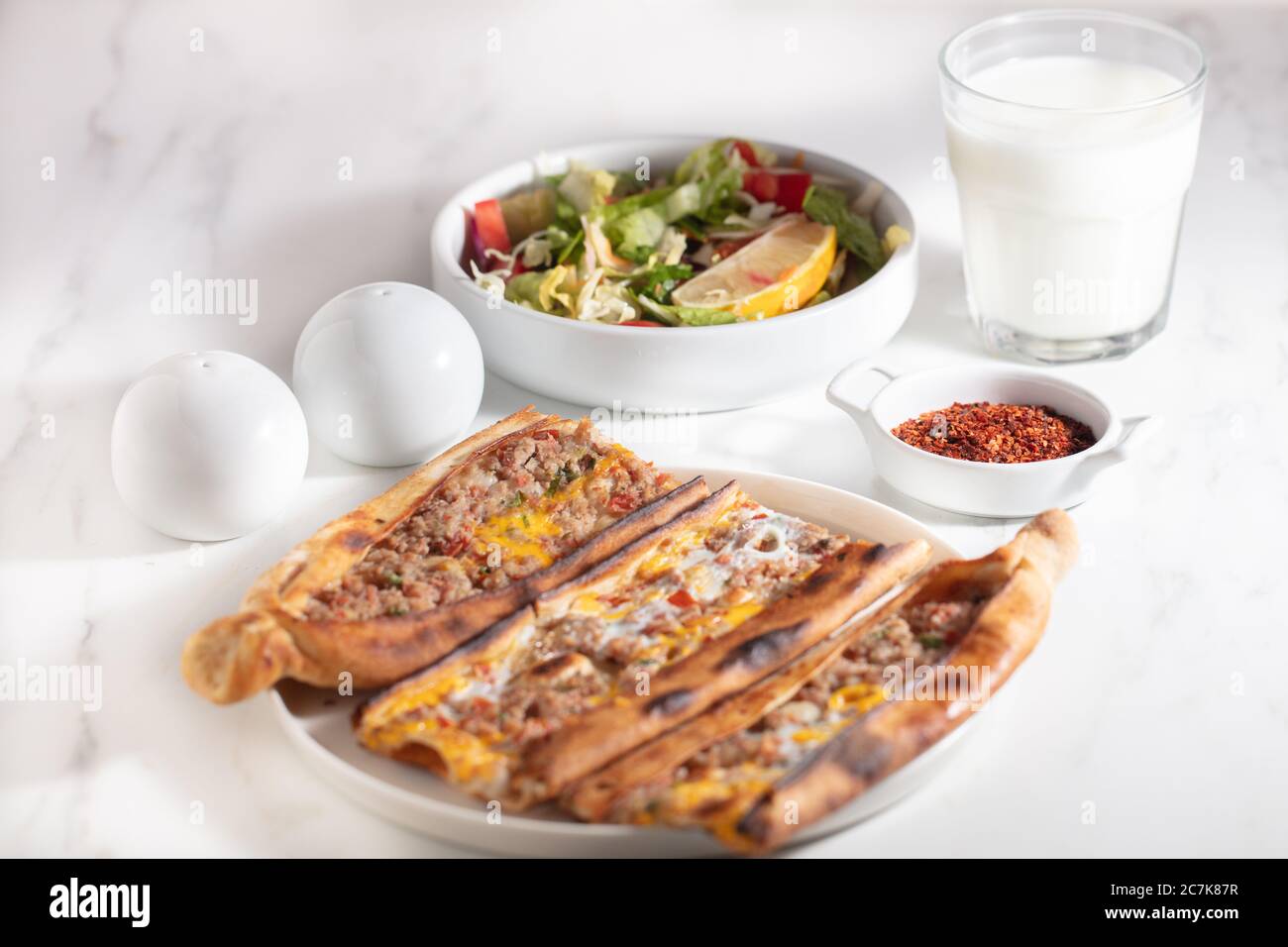 Traditional Turkish pide with meat and egg Stock Photo - Alamy