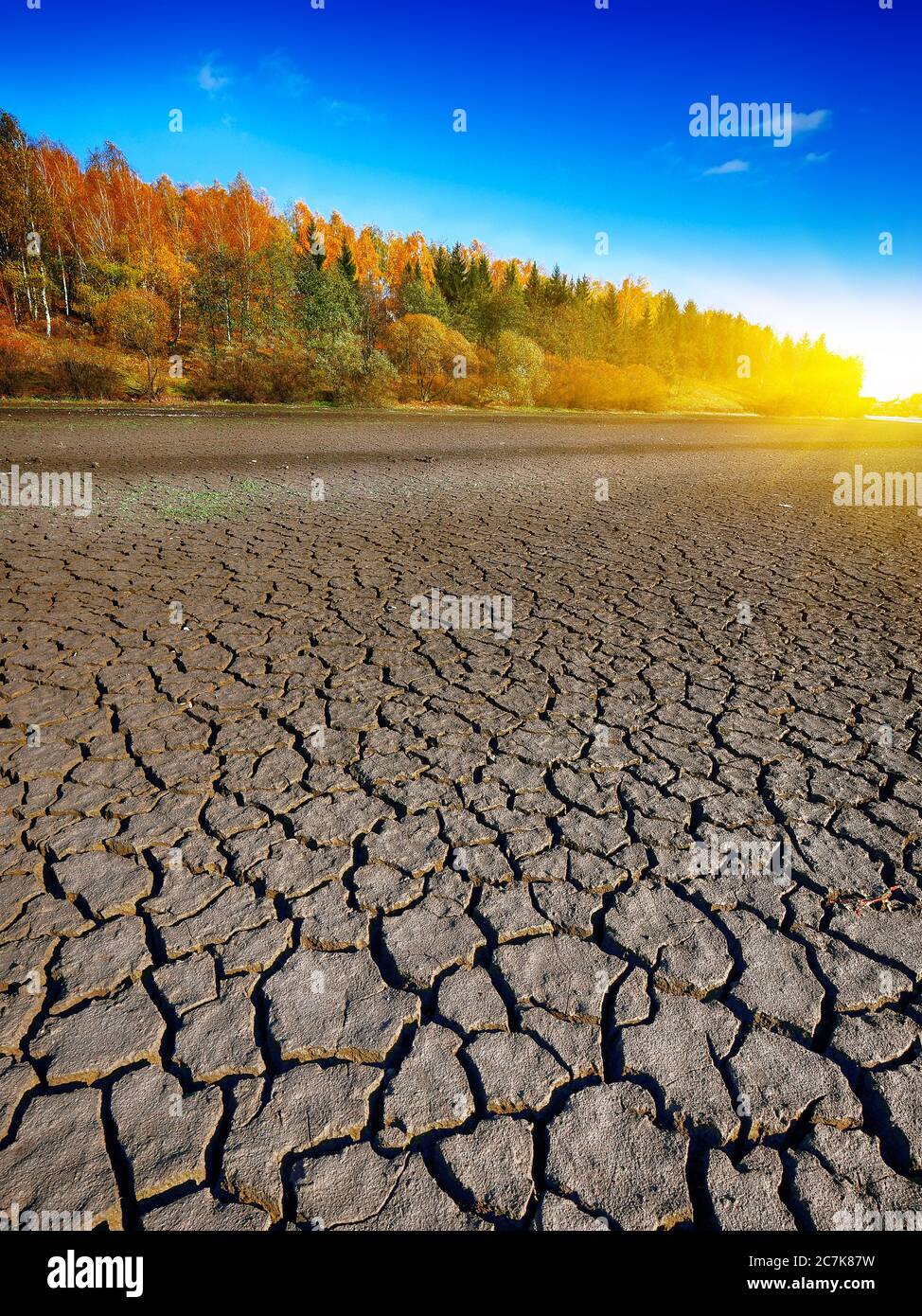 Land with dry and cracked ground. Climate change, dry lake. Autumn ...