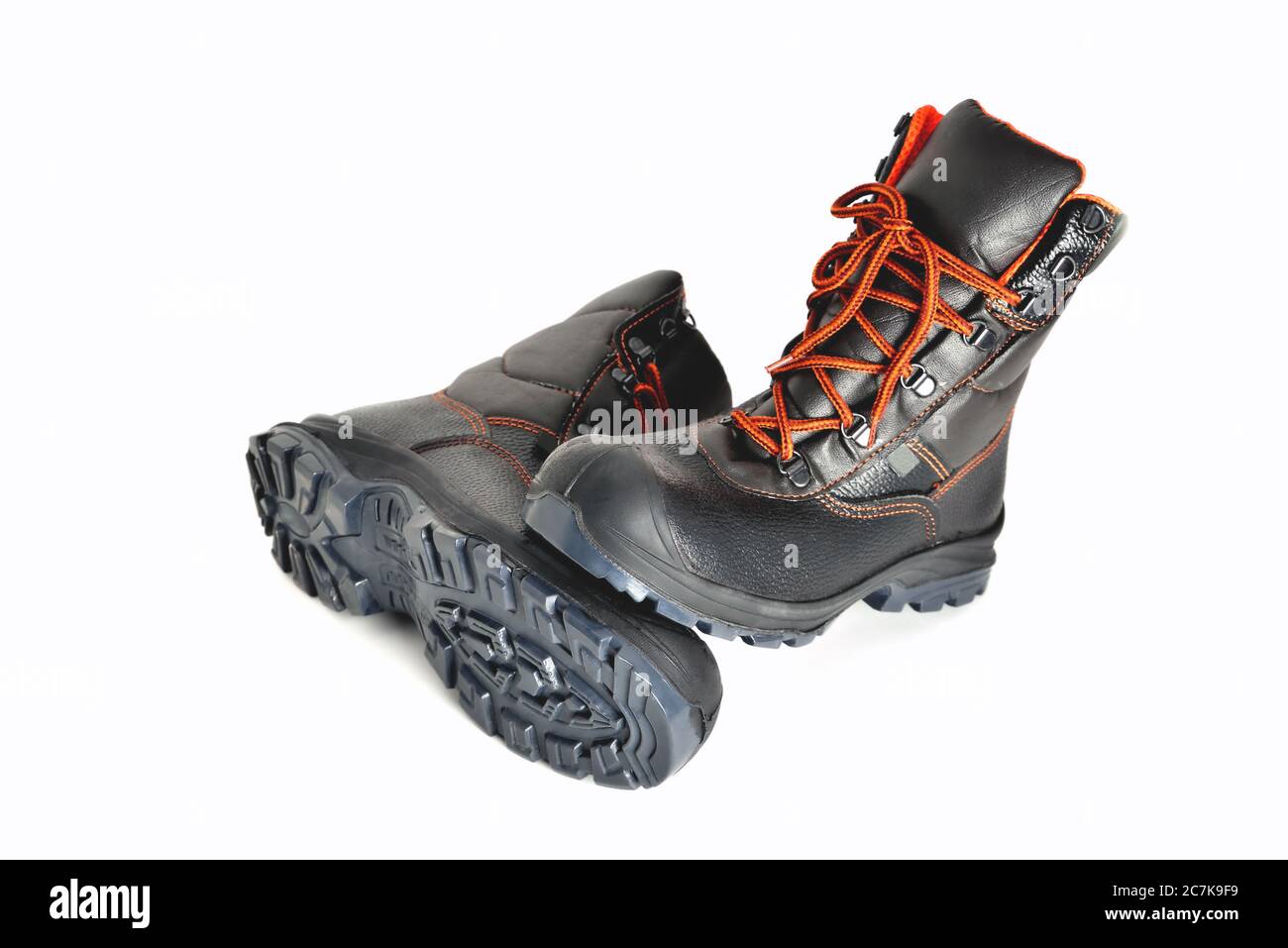 Black high boots with orange laces on a white background, off-road ...
