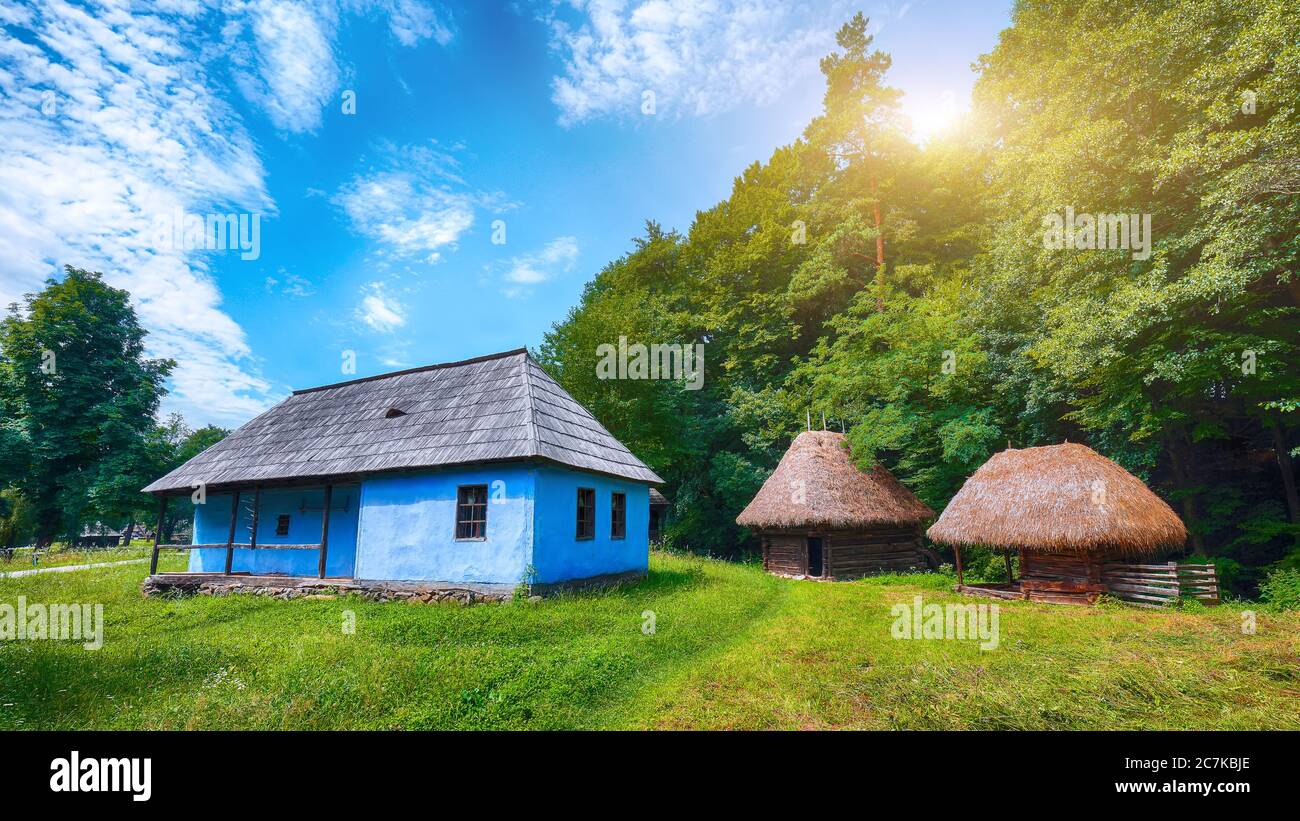 Fantastic summer scene in Transylvania. View of traditional romanian ...