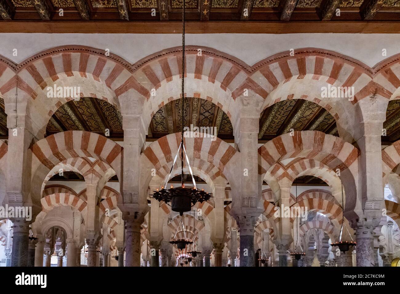 The columns and double-tiered arches in the original section of the ...