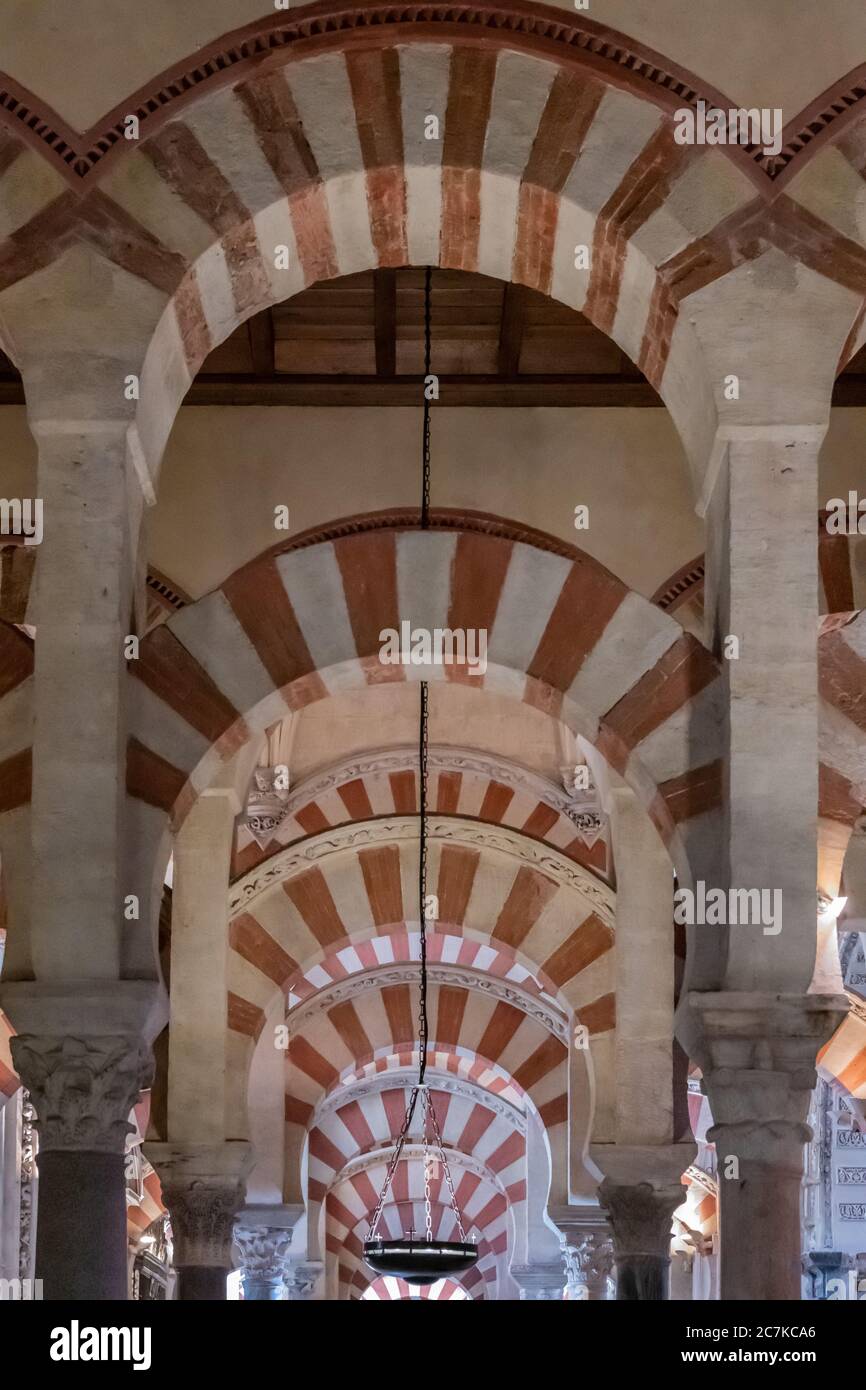 The columns and double-tiered arches in the original section of the ...