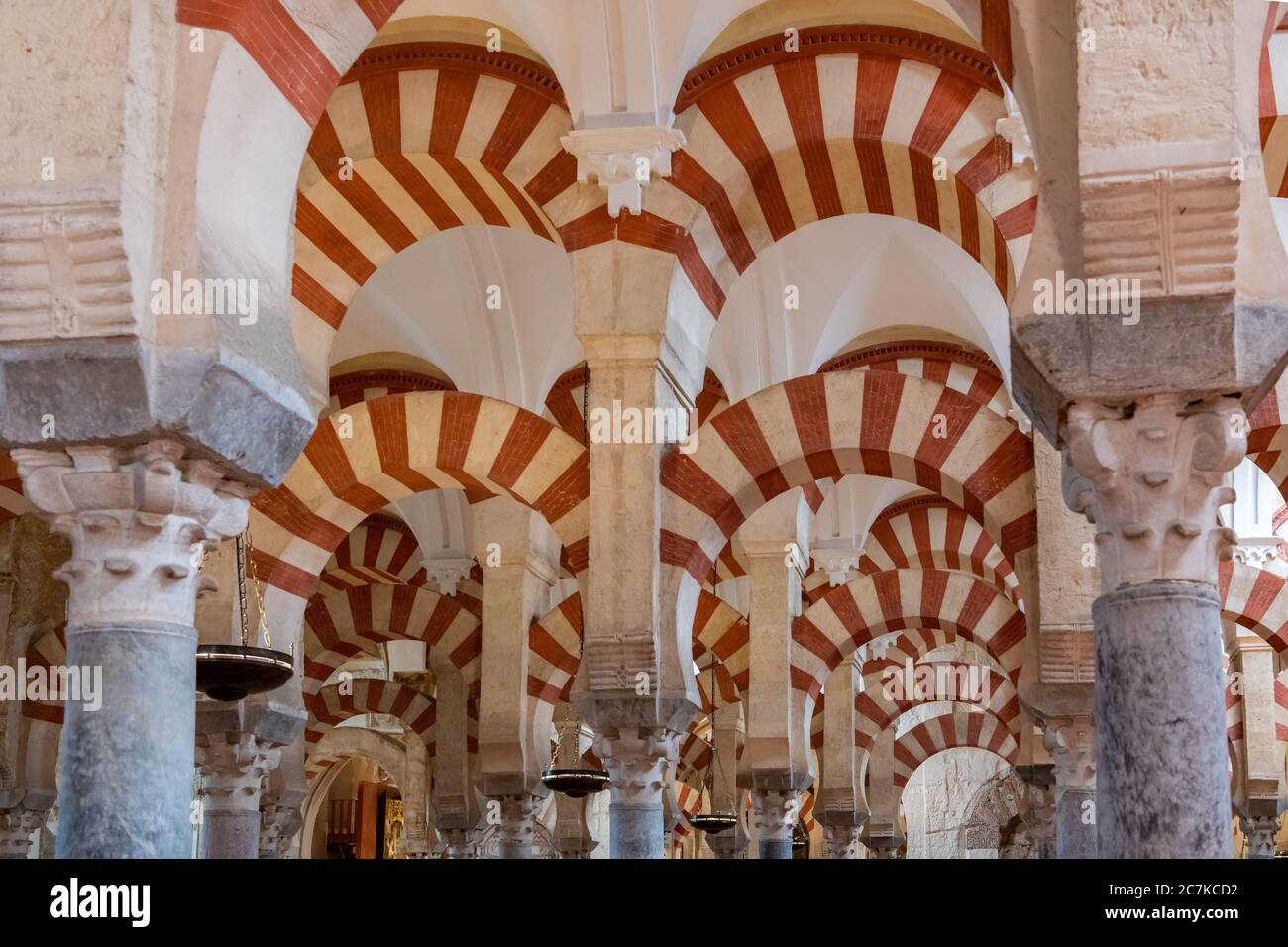 The columns and double-tiered arches in the original section of the ...