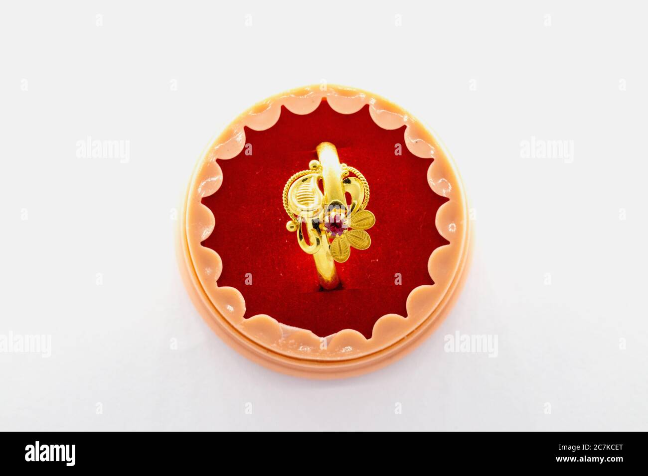 one red stone gold ring in the box with white background Stock Photo ...