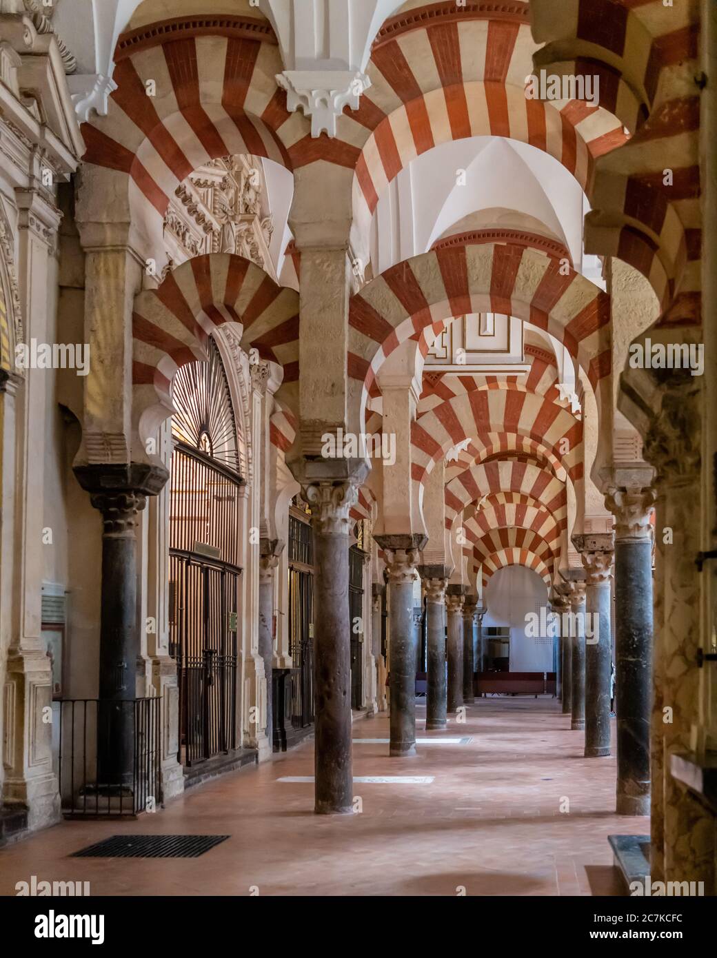 The columns and double-tiered arches in the original section of the ...