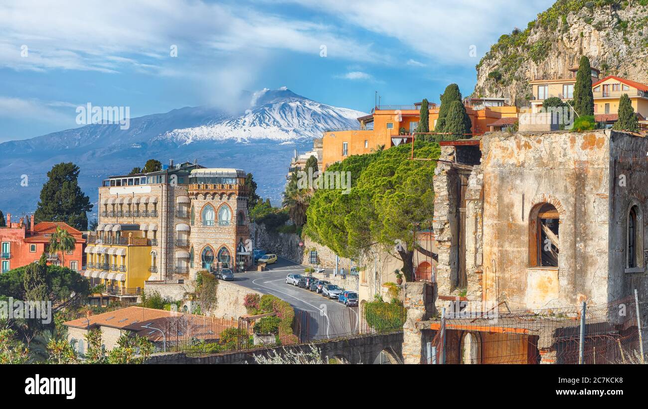Etna volcano and Taormina town aerial panoramic view. Roofs of a lot of ...