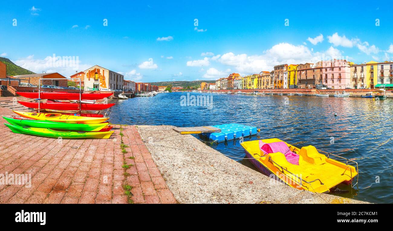 Panoramic cityscape of Bosa town on Temo river. River embankment with ...
