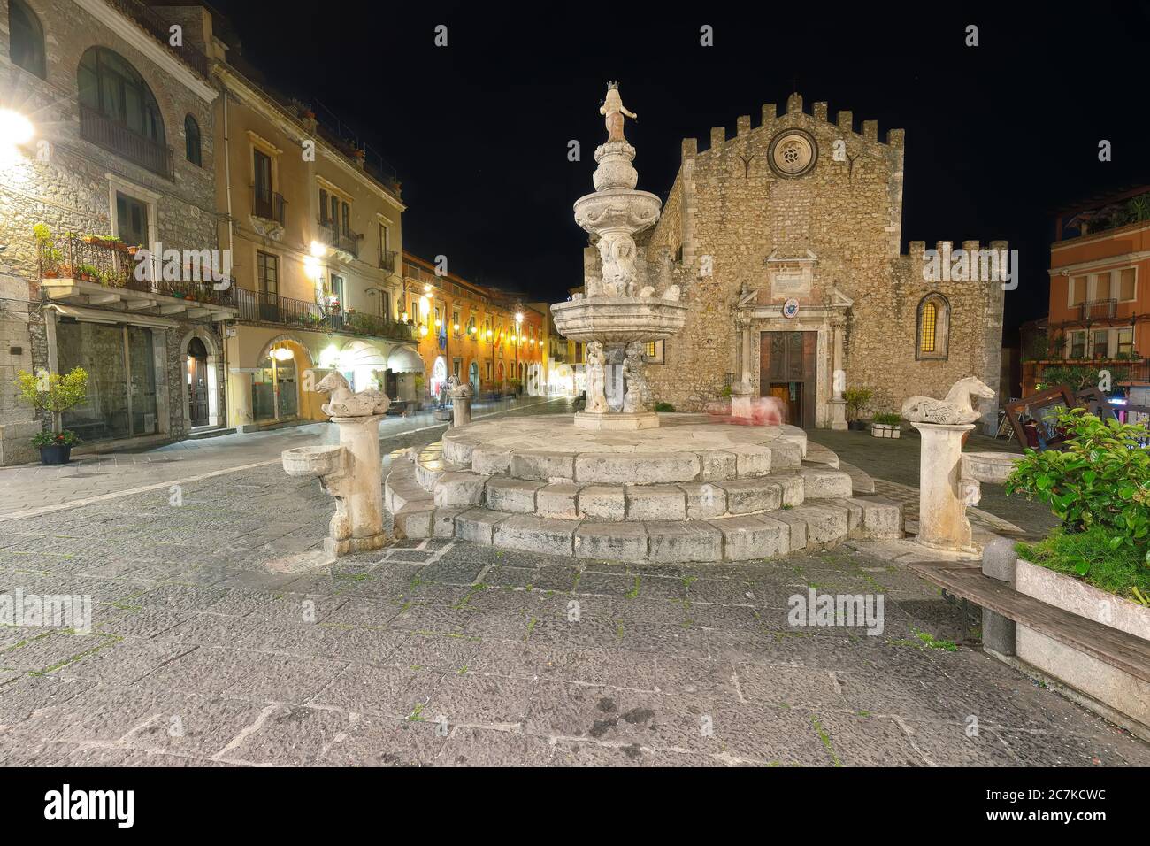 Cathedral of Taormina and fountain on the square Piazza Duomo in ...