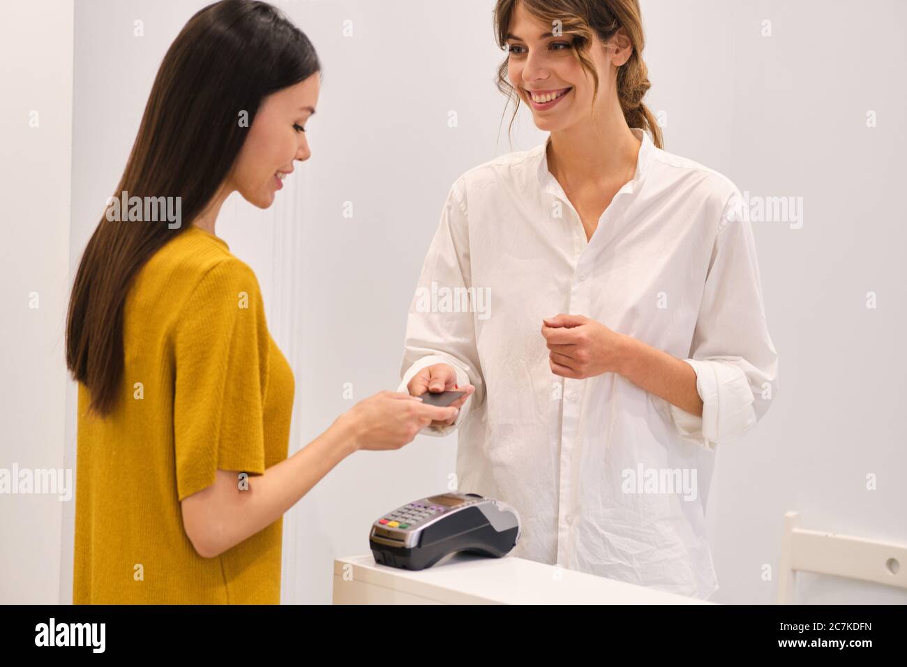 Beautiful young woman happily hi-res stock photography and images - Alamy