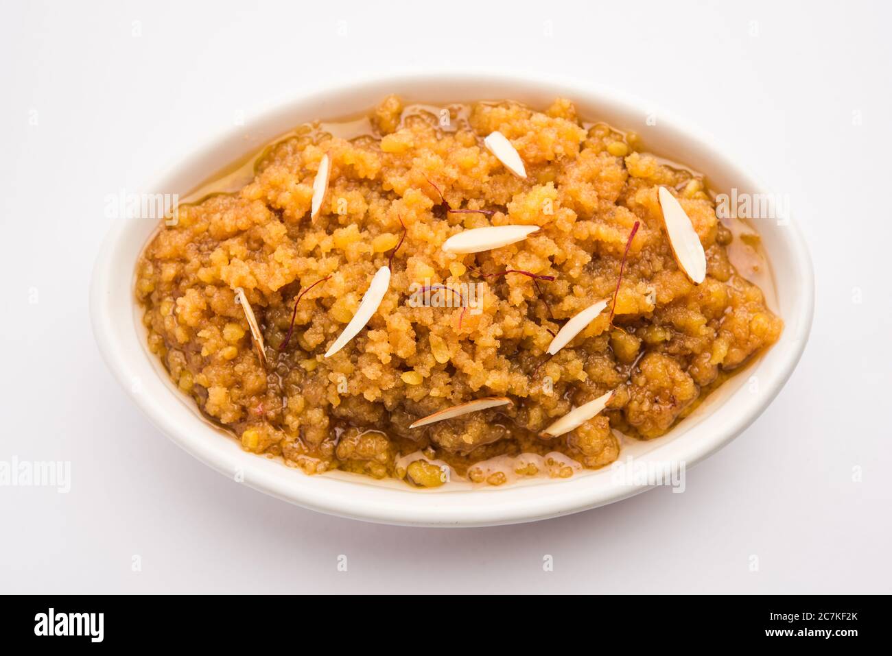 Moong dal halwa is a classic Indian sweet dish made with moong lentils ...