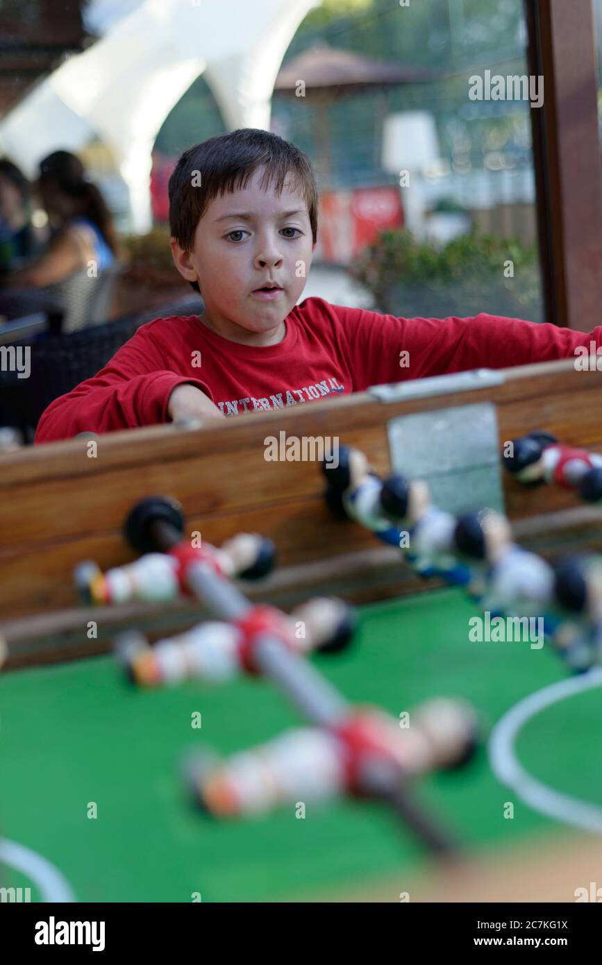 toddler playing table soccer Stock Photo - Alamy