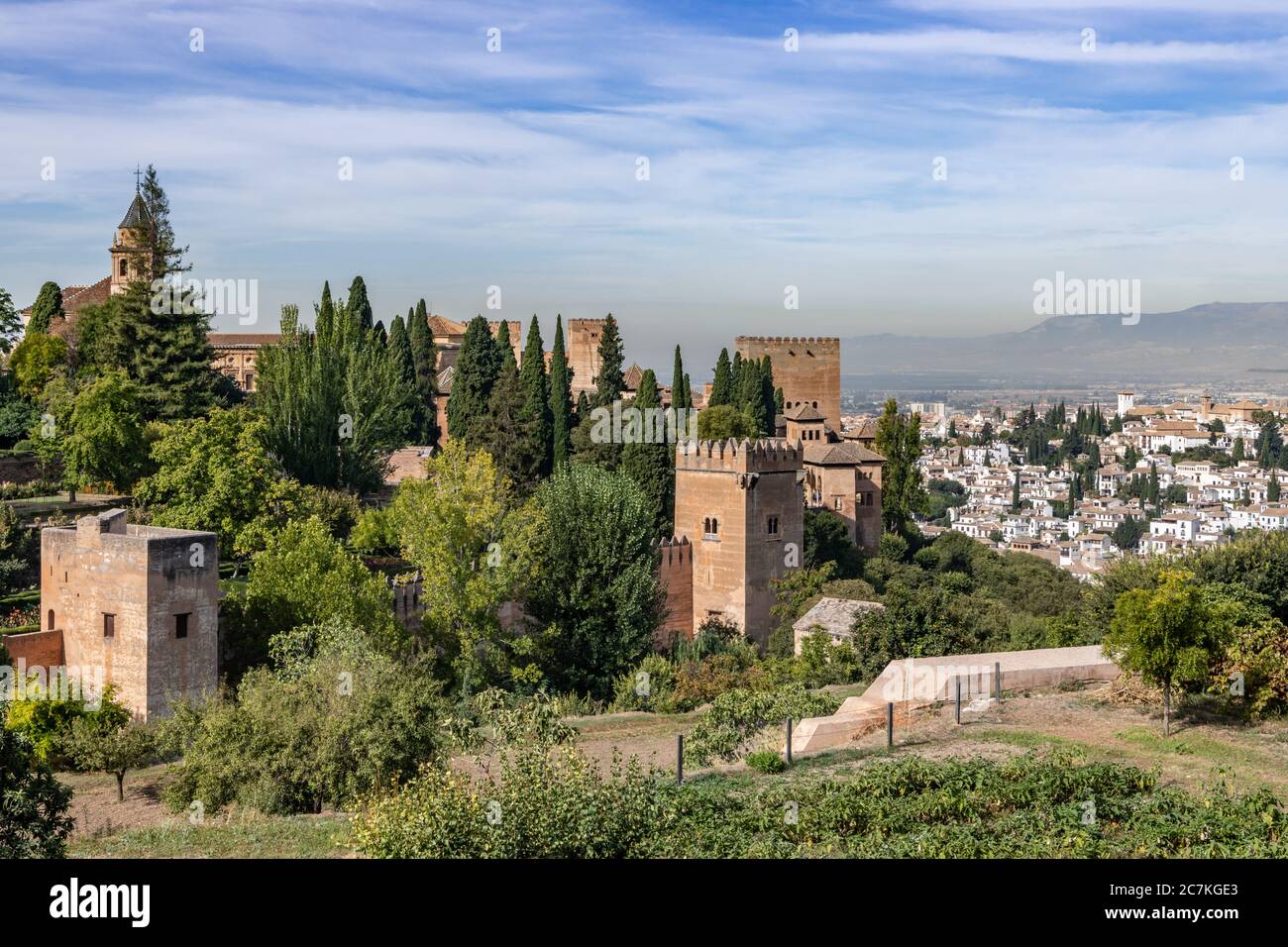 A view of the Alhambra's ramparts and towers with the Albaicin in the ...