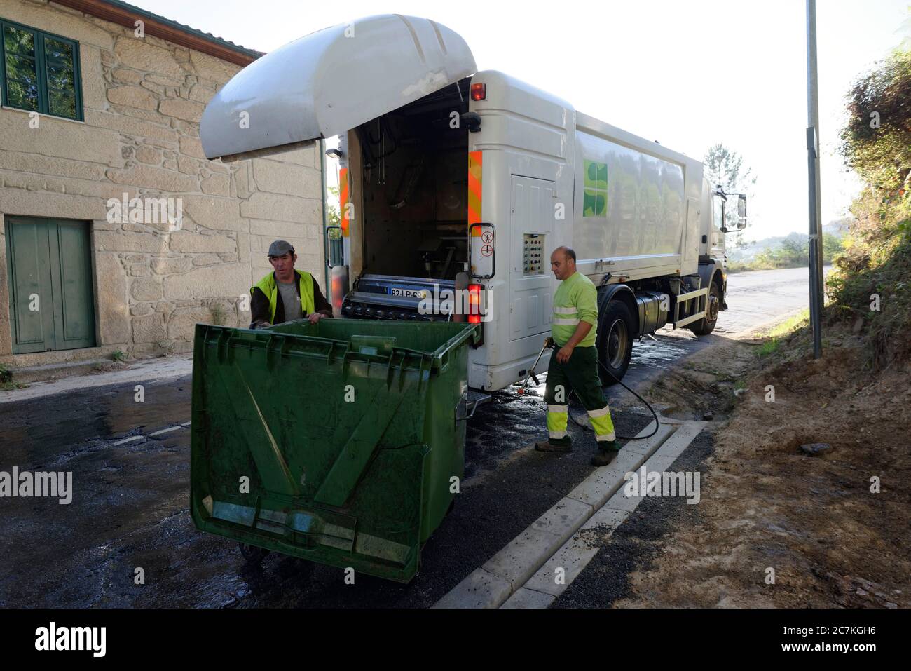 washing waste containers Stock Photo - Alamy