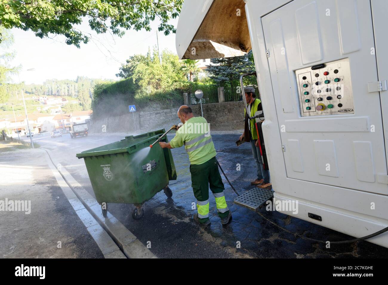 washing waste containers Stock Photo - Alamy