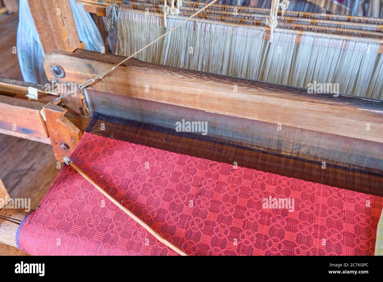 Myanmar, Inle lake: Loom at the silk factory Stock Photo - Alamy