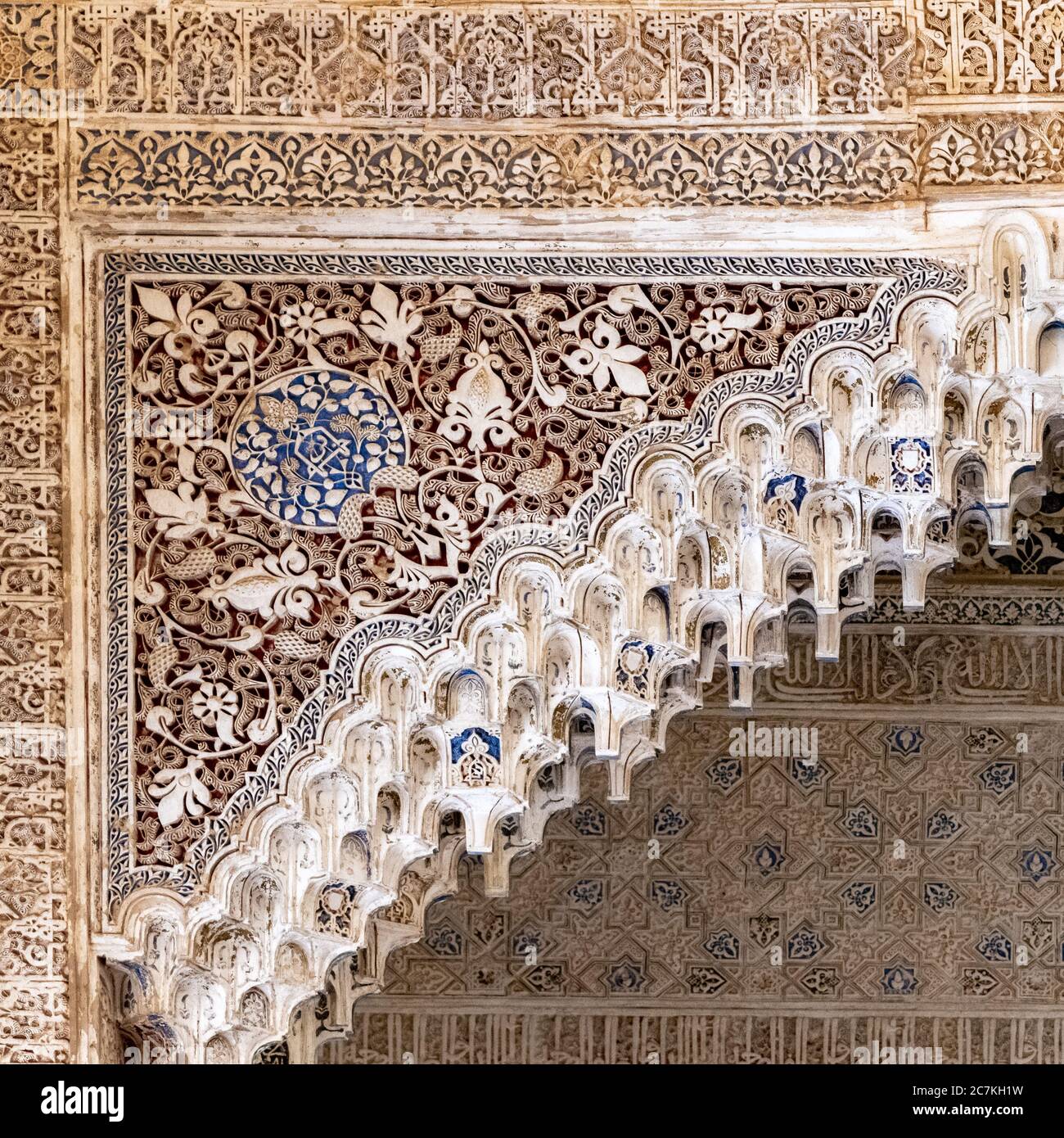 Intricate decoration adorns a muqarnas arch in the Hall of Kings in ...