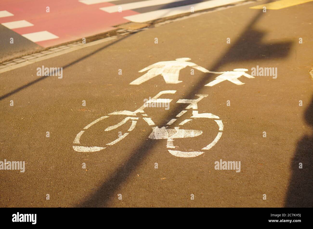High angle shot of road signs on the ground for cyclists and ...