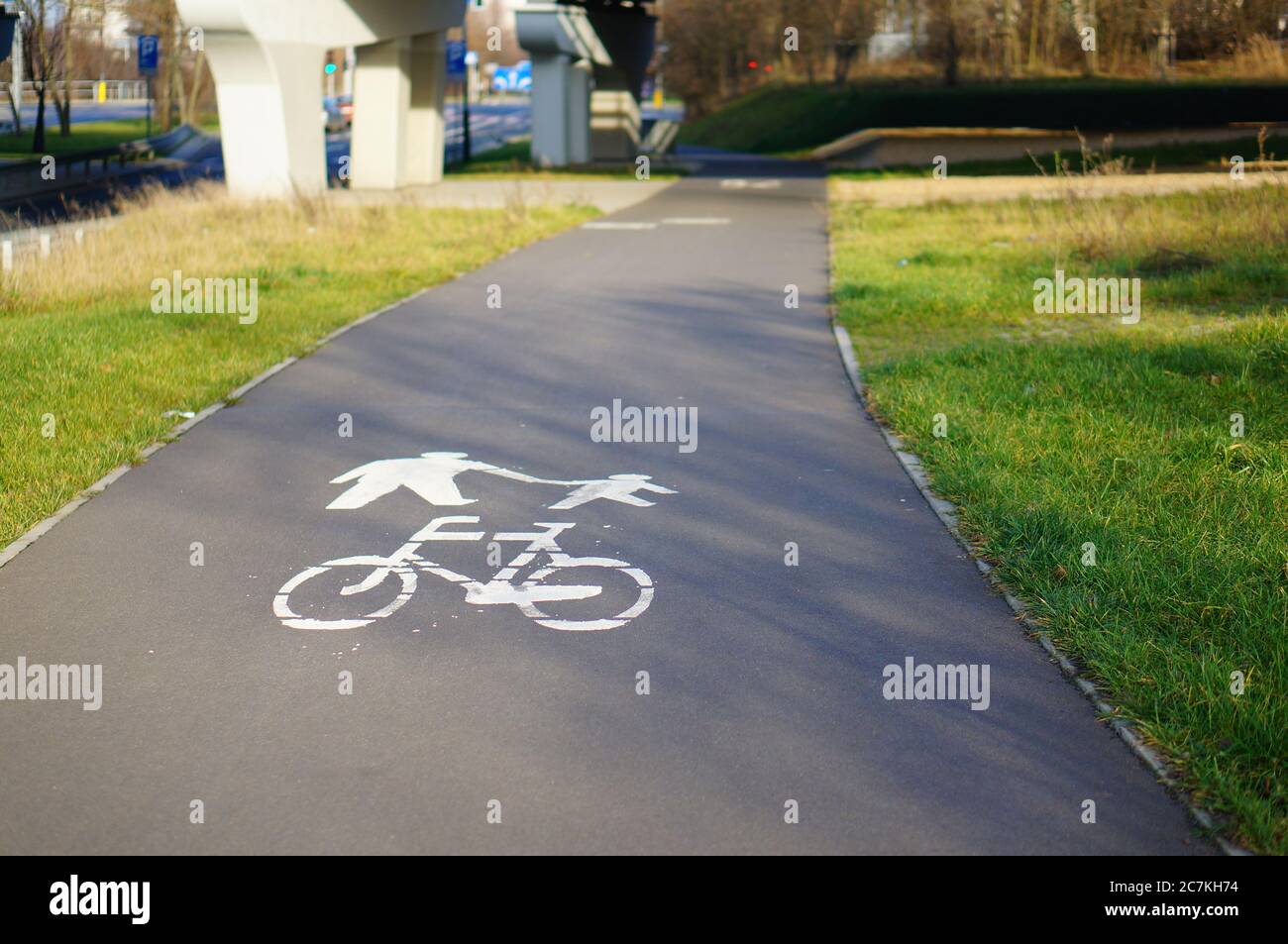 High angle shot of road signs on the ground for cyclists and ...