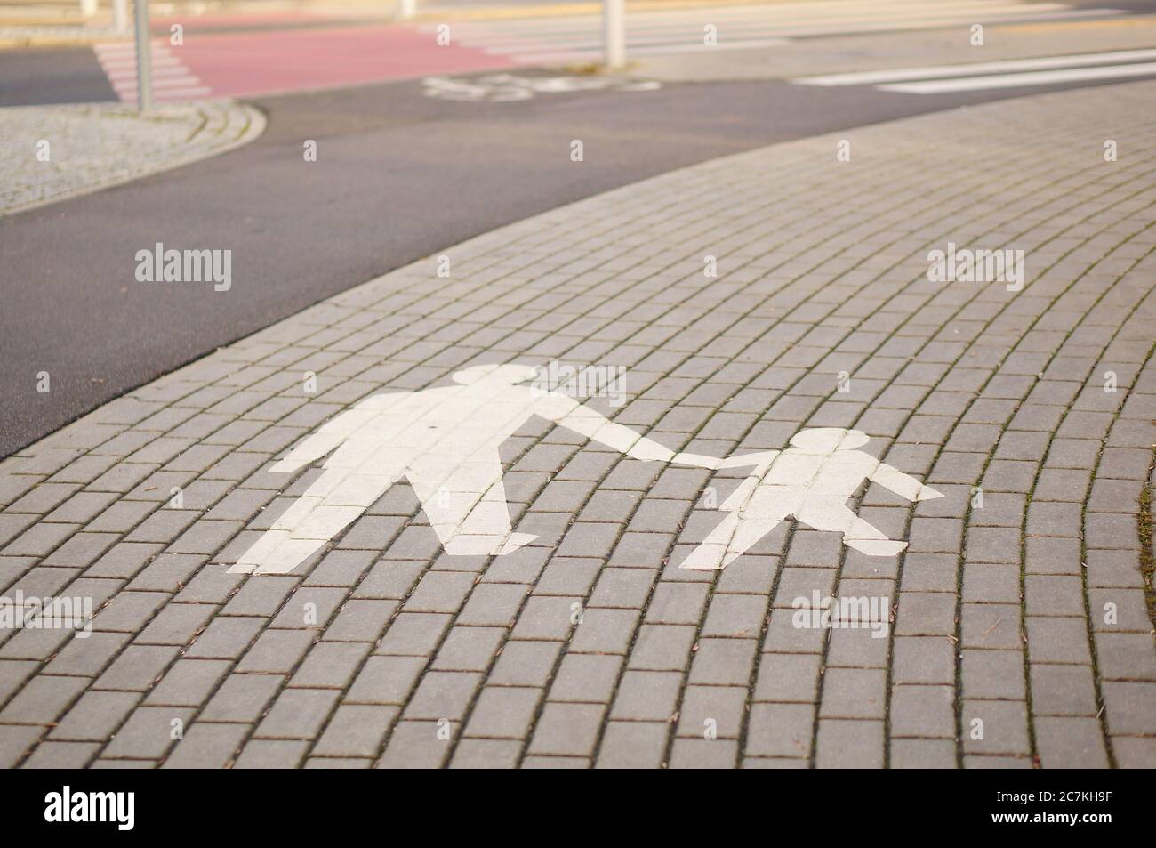 High angle shot of road signs on the ground for cyclists and ...