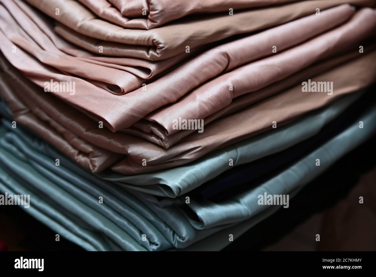 Folded cloth in piles hi-res stock photography and images - Alamy