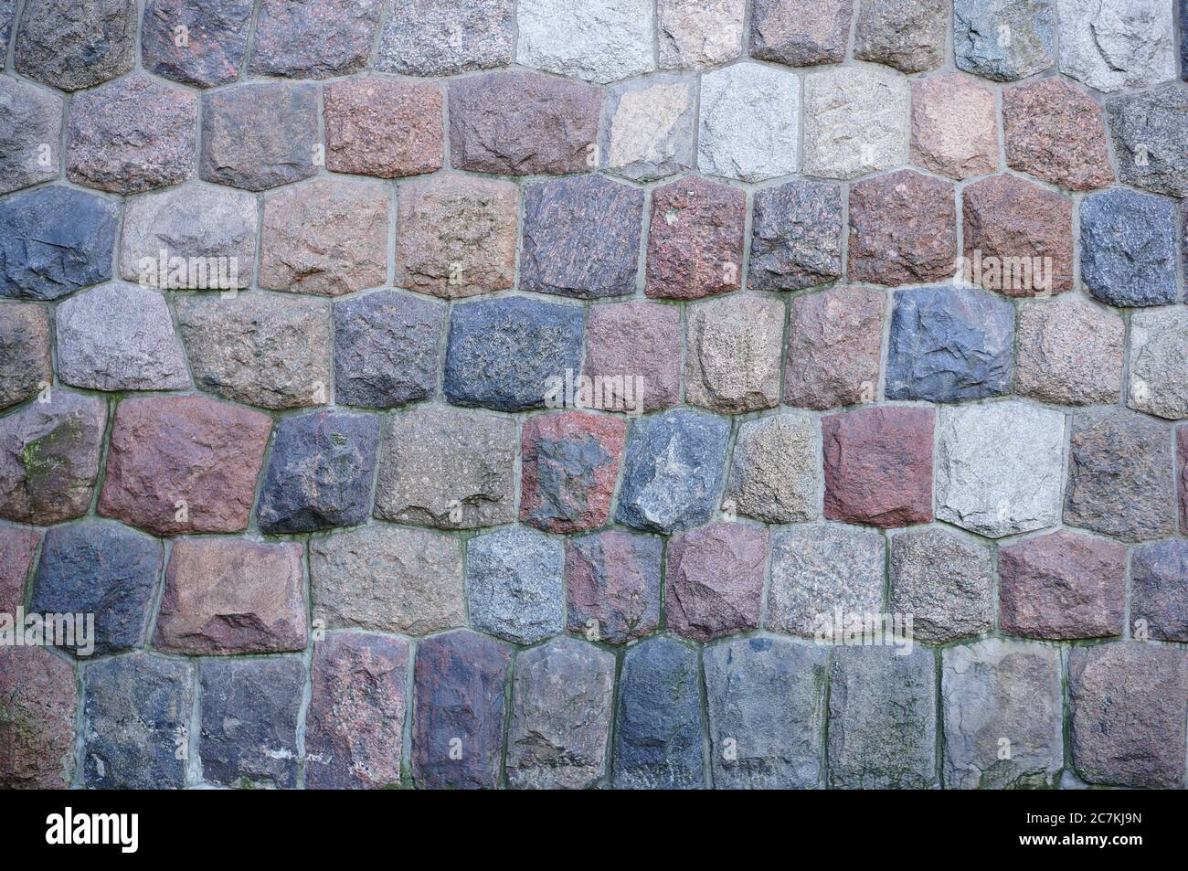 Closeup shot of a cobblestone wall with colorful stones Stock Photo - Alamy