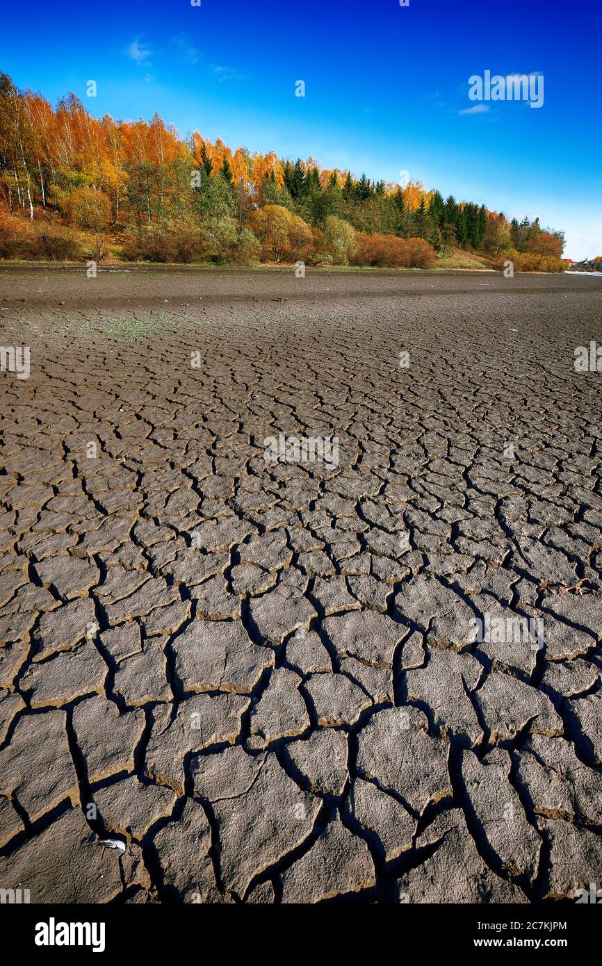 Land with dry and cracked ground. Climate change, dry lake. Autumn ...