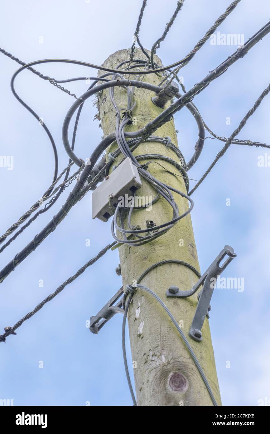 Rural BT utility pole with various fibre optic broadband & telephone ...