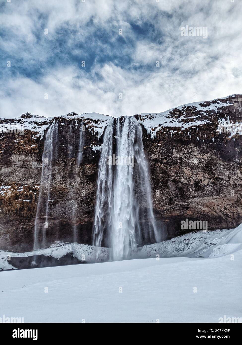 snowy waterfall Seljalandsfoss, Iceland Stock Photo - Alamy