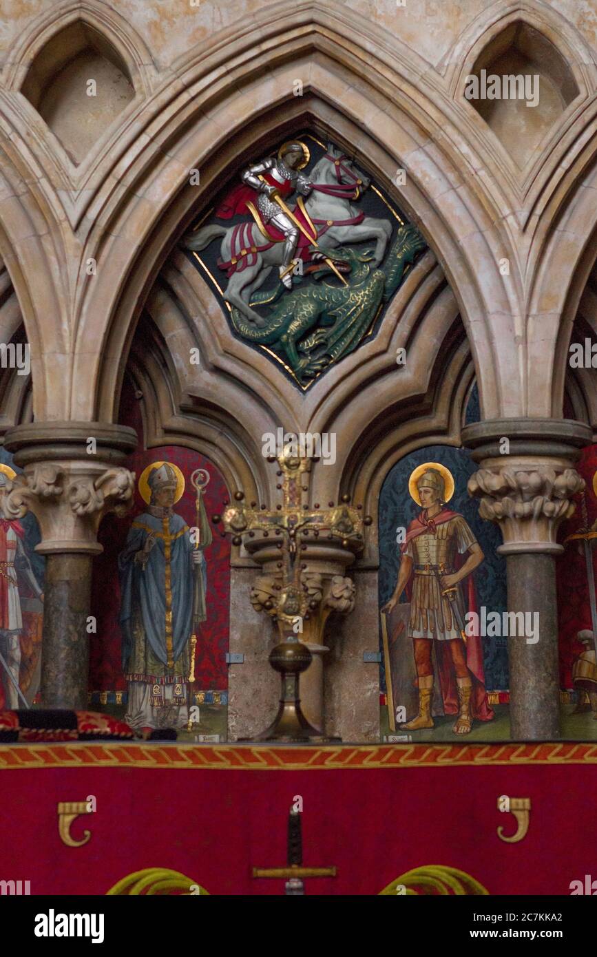 Vertical shot of the religious pictures on the wall of a basilica Stock ...