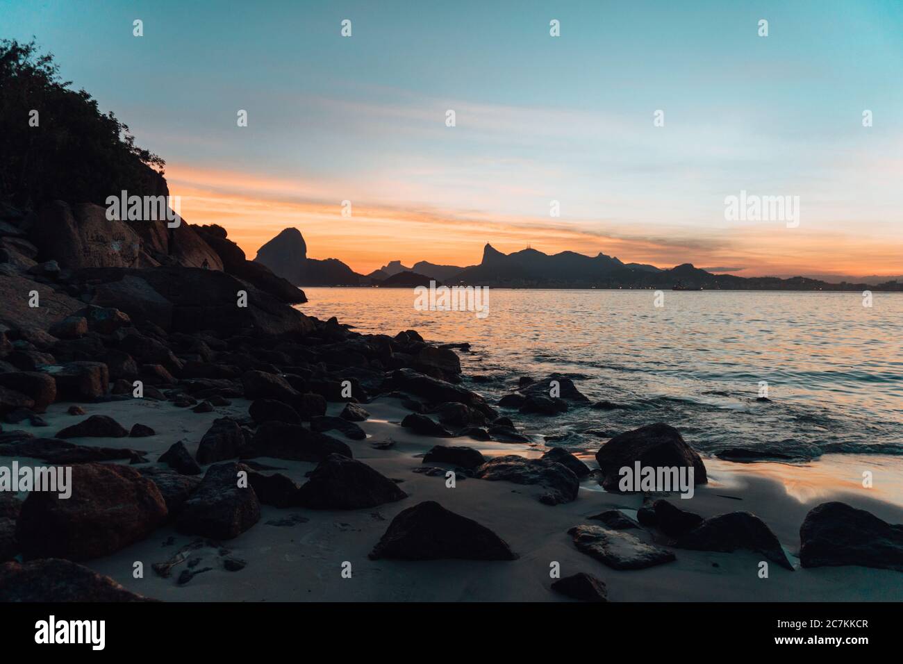Beautiful landscape shot of the beach in Rio, Brazil with rocks and ...
