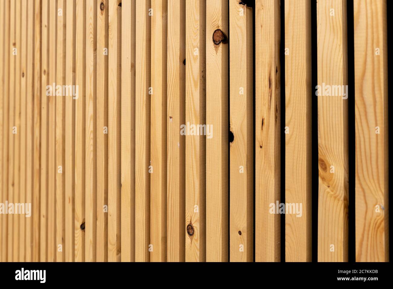 Abstract background of wooden strips. Vertical fence of wooden slats ...