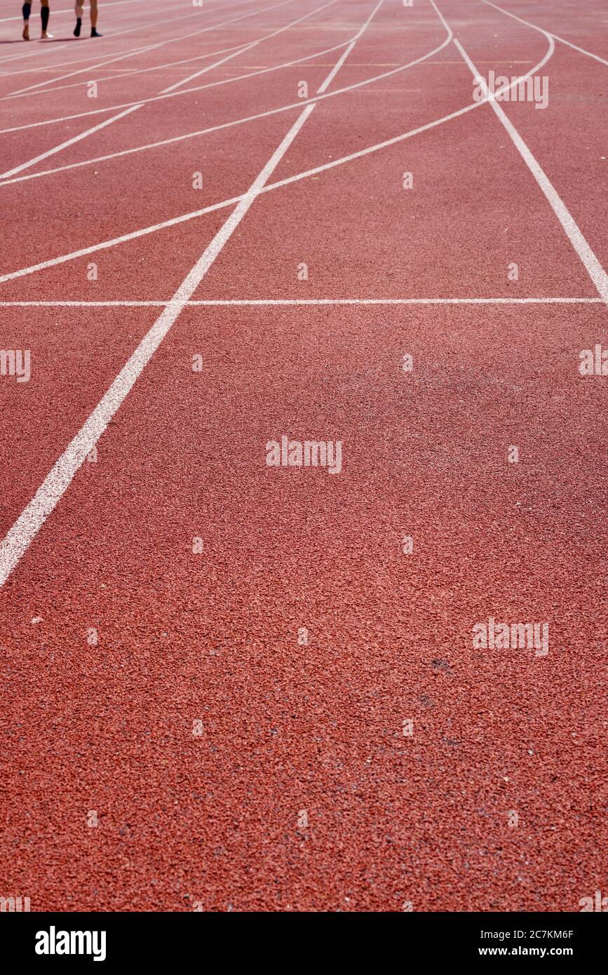 Vertical high angle shot of the running track ground in the stadium ...