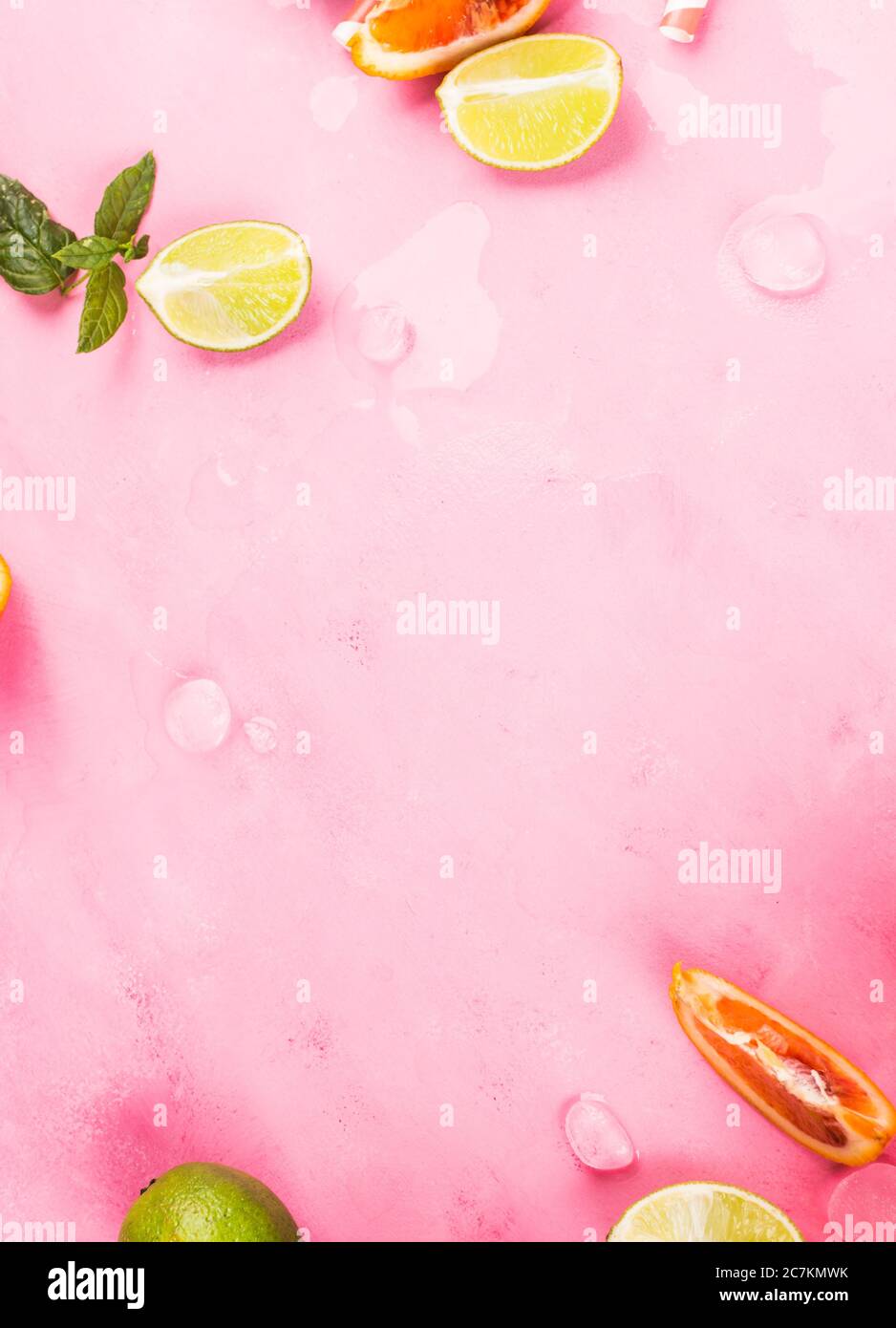 Summer pink background with citrus slices Stock Photo - Alamy