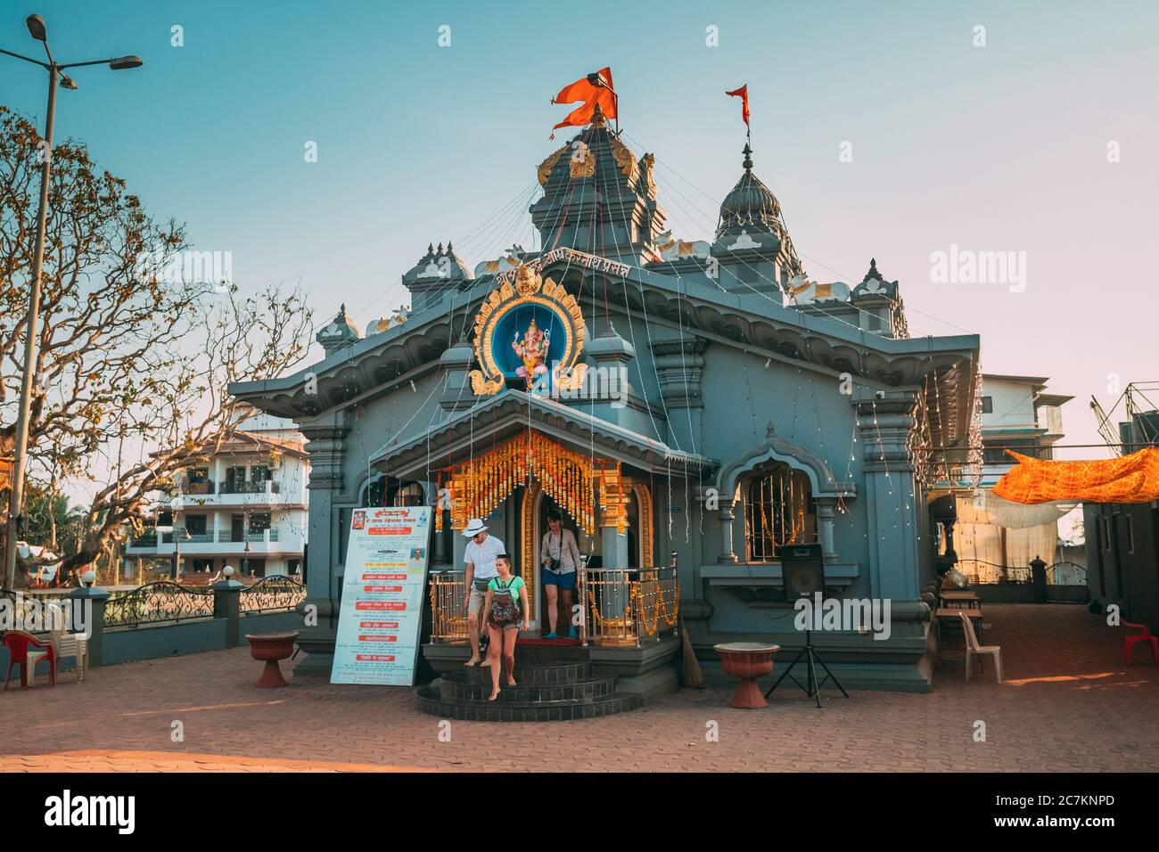 Sangolda, Goa, India. Tourists leaves the Sri Amrekarnath Temple ...