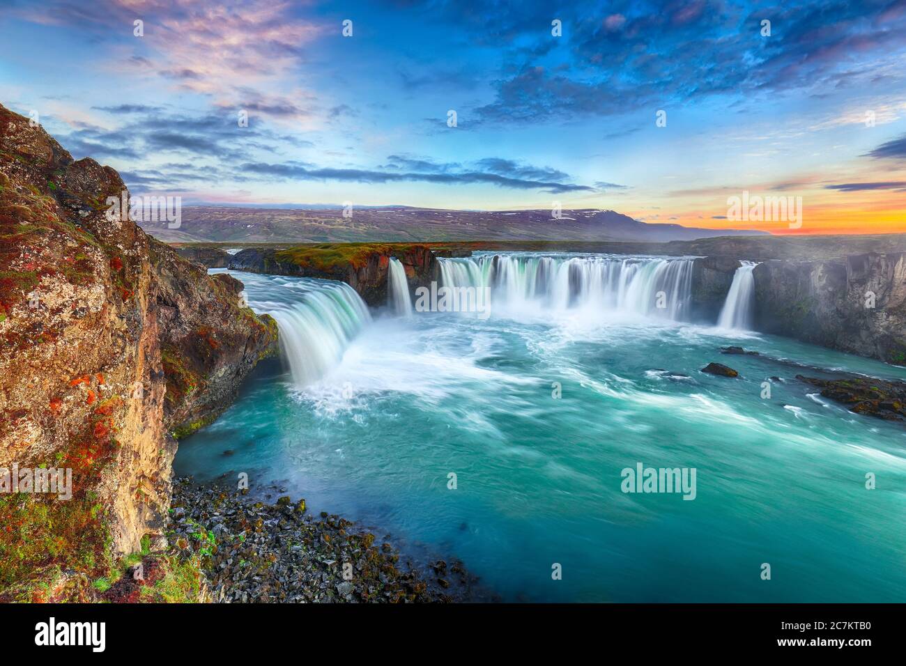 Fantastic sunset scene of powerful Godafoss waterfall. Dramatic sky ...