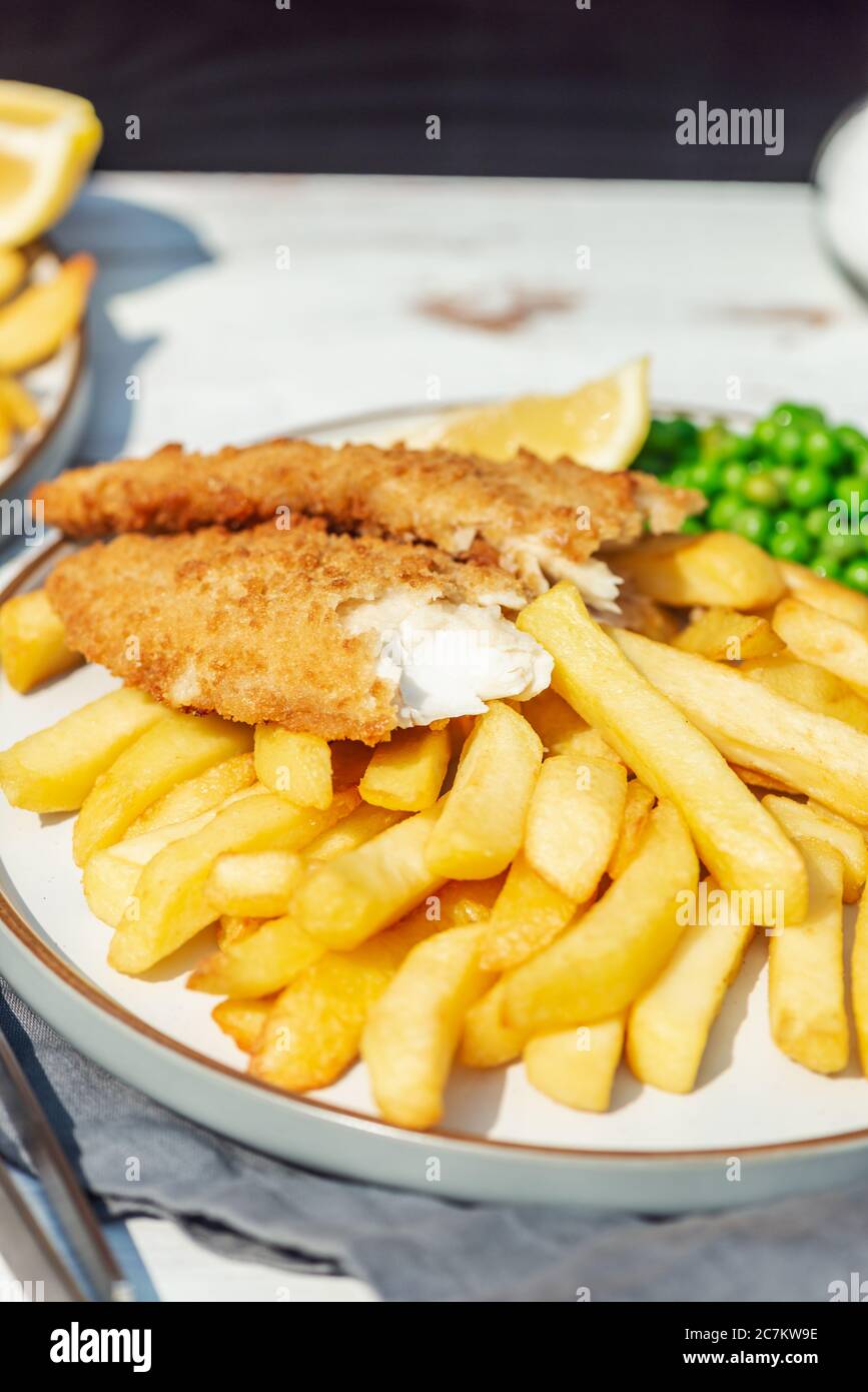 Fish and Chips with peas Stock Photo - Alamy