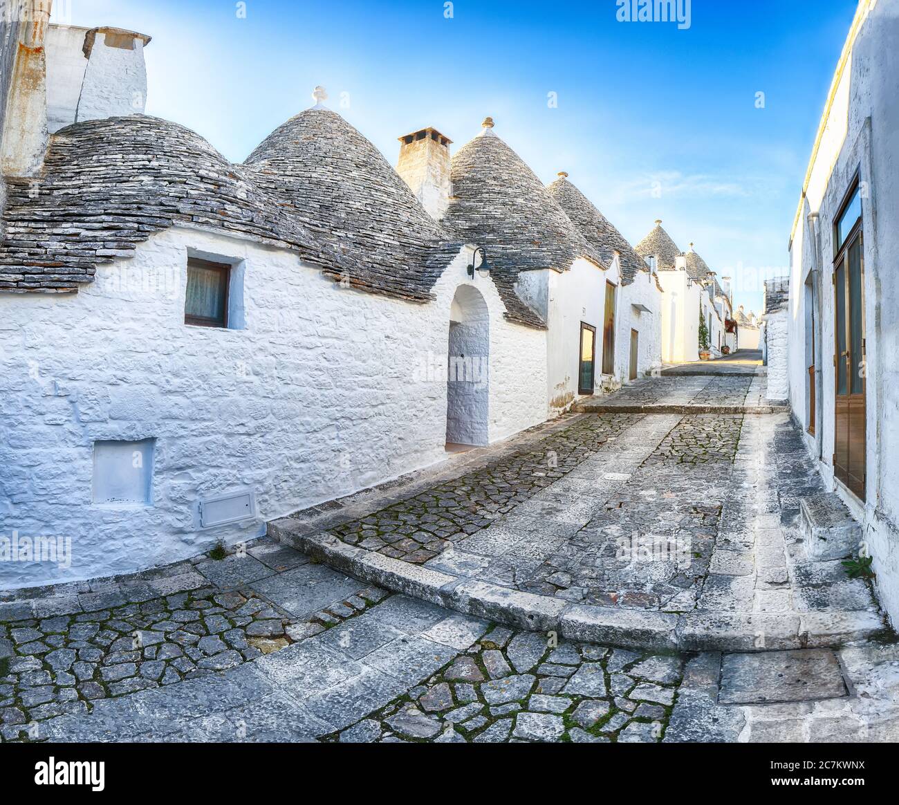 Trulli of Alberobello typical houses street view. Town of Alberobello ...