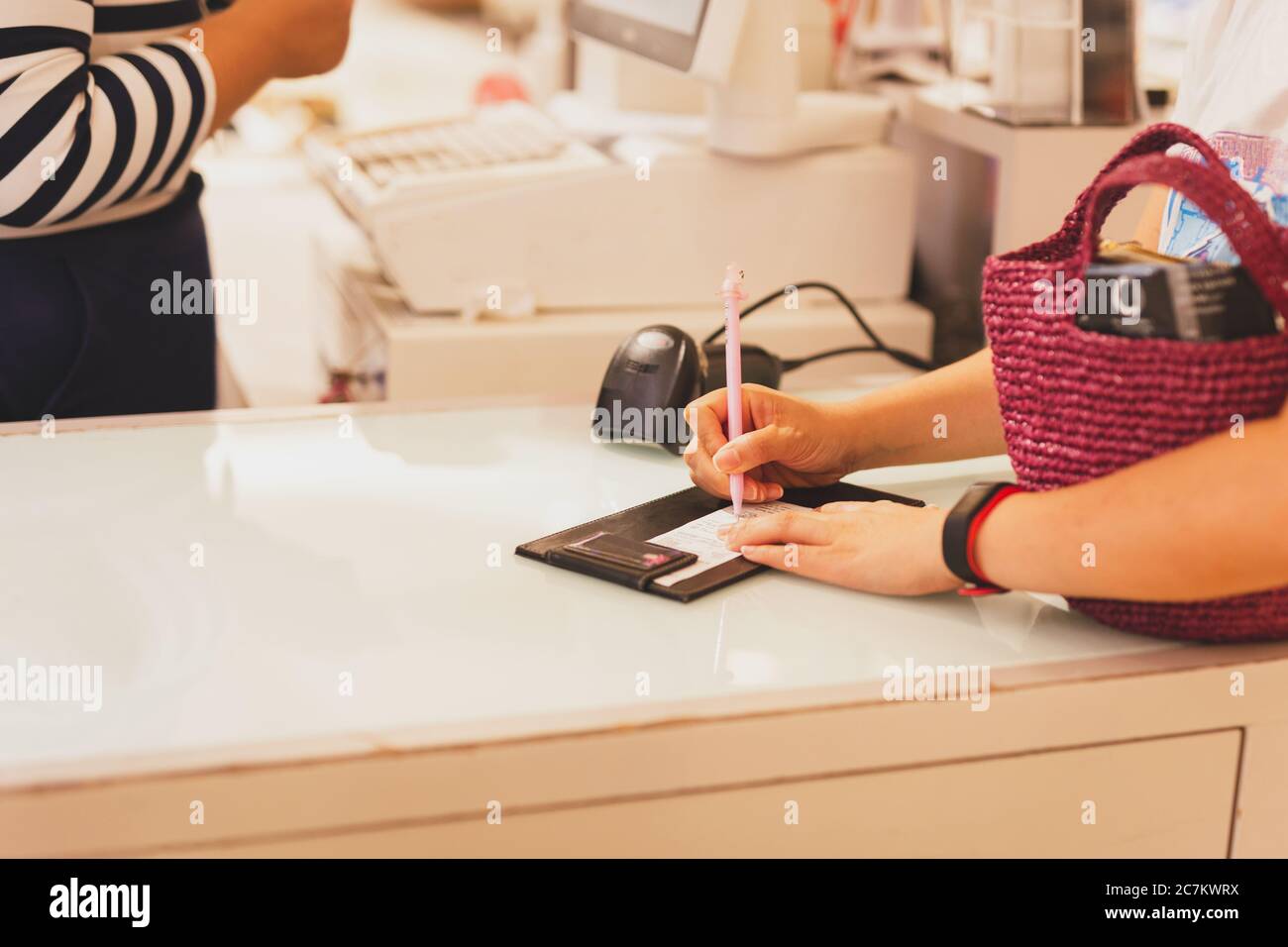 Consumer signature on a sale transaction receipt in shopping mall Stock ...