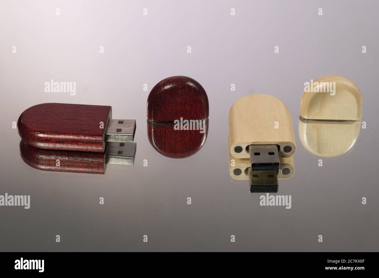 Two usb-sticks with open cap made with wooden, grey background Stock ...