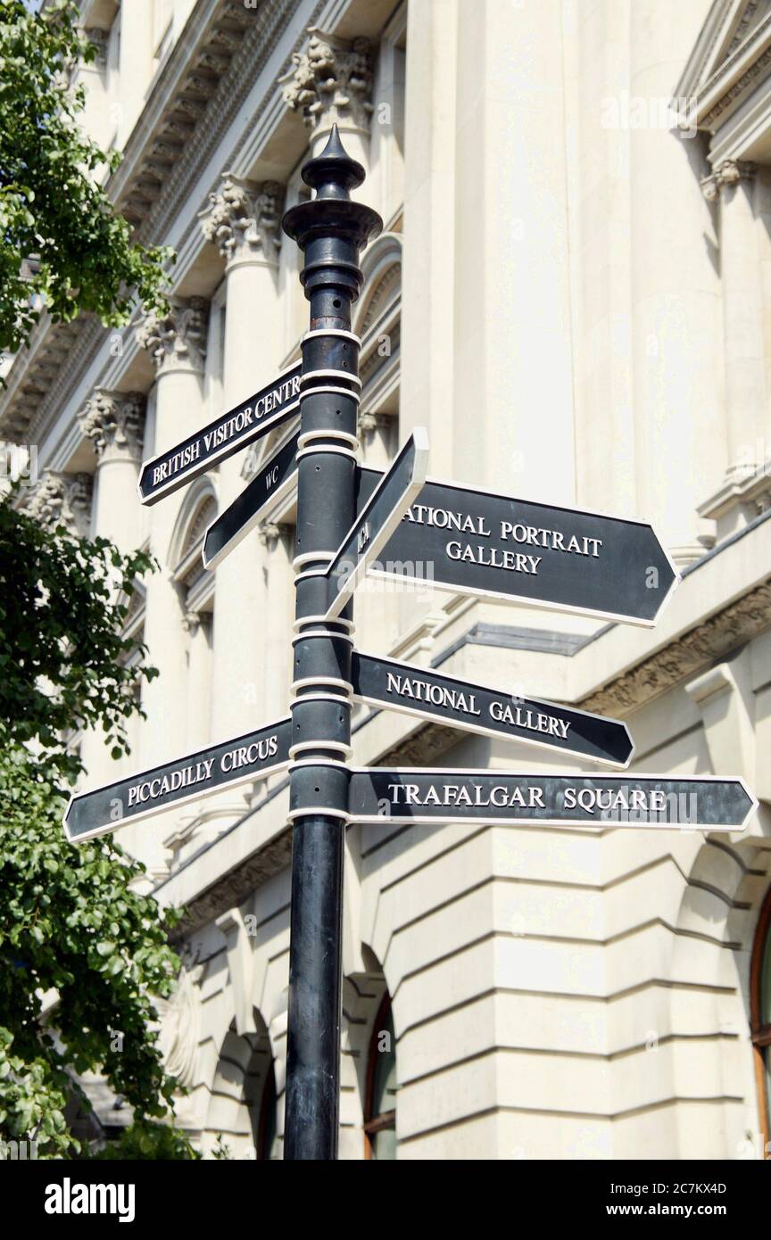 Street signpost giving directions to National Gallery, Trafalgar Square ...