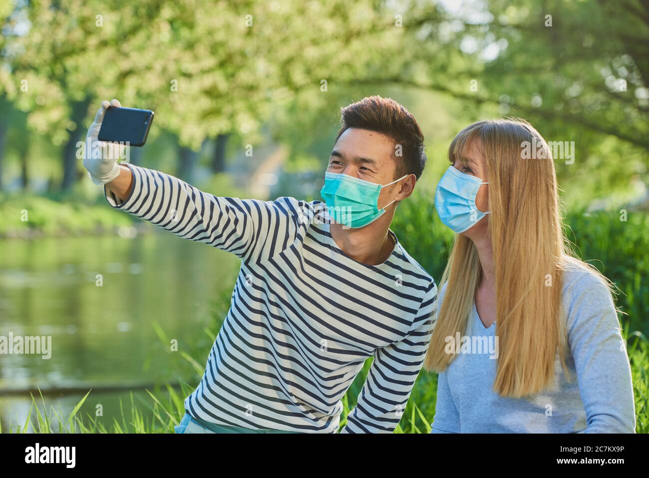 Wearing face mask masks man woman couple asian hi-res stock photography ...
