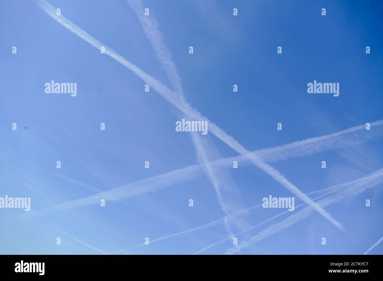 Photo of Airplanes crossing paths in the air Stock Photo - Alamy