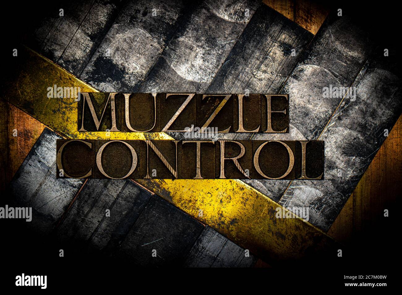 Muzzle Control text formed with real authentic typeset letters on ...