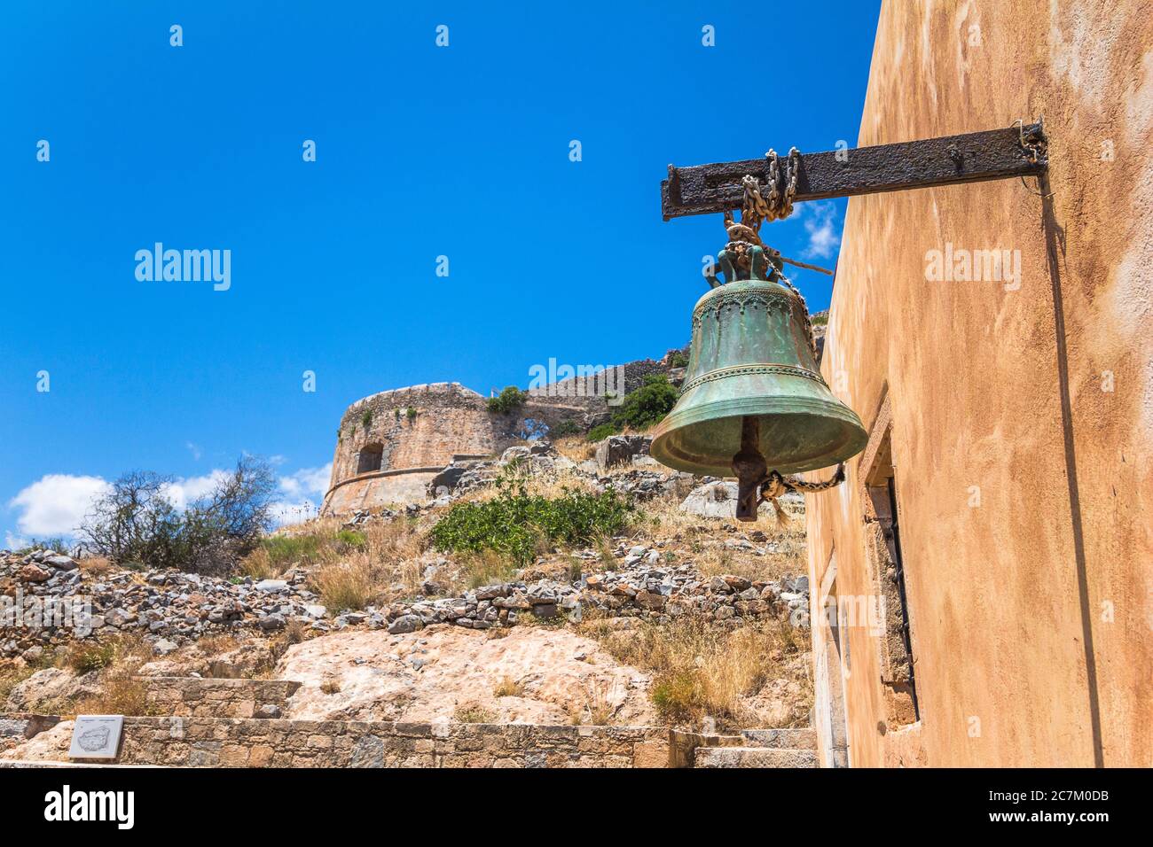 Bell on grounds of Spinalonga, island of lepers, Plaka, northeastern ...