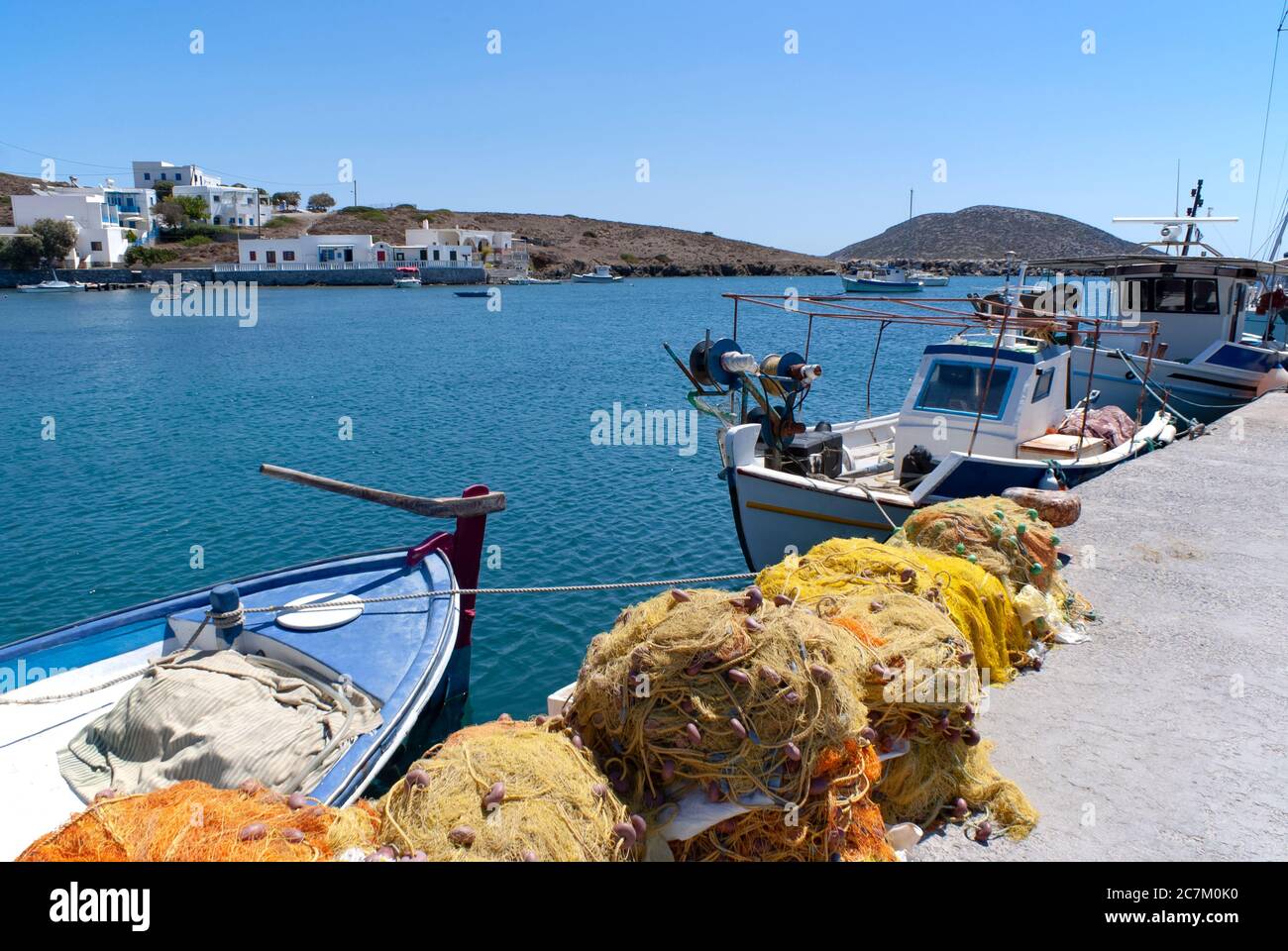 Fishing boats at a jetty in the Greek island of Astypalaia Stock Photo ...