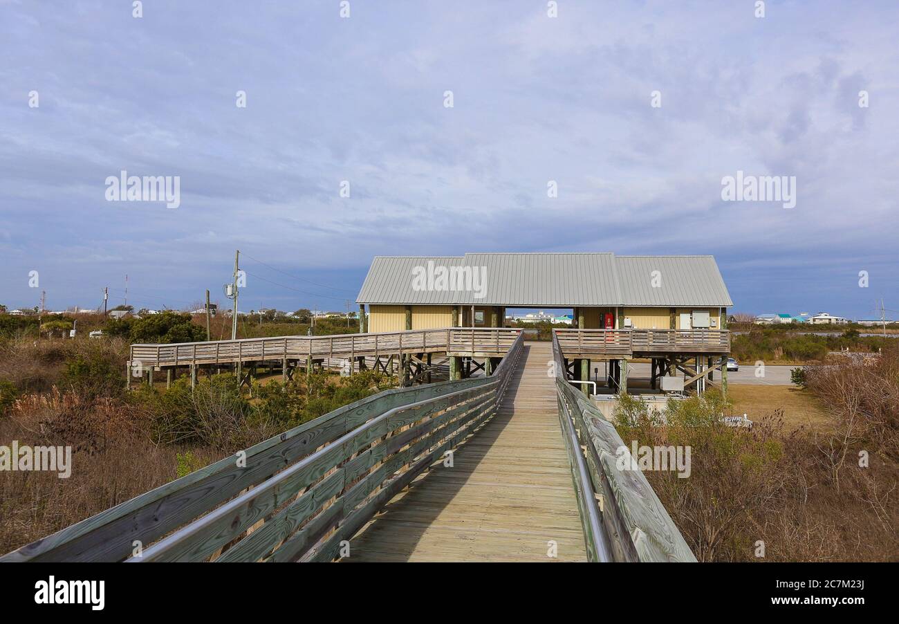 Grand Isle, Louisiana - February 2018: A pier allows people to walk ...