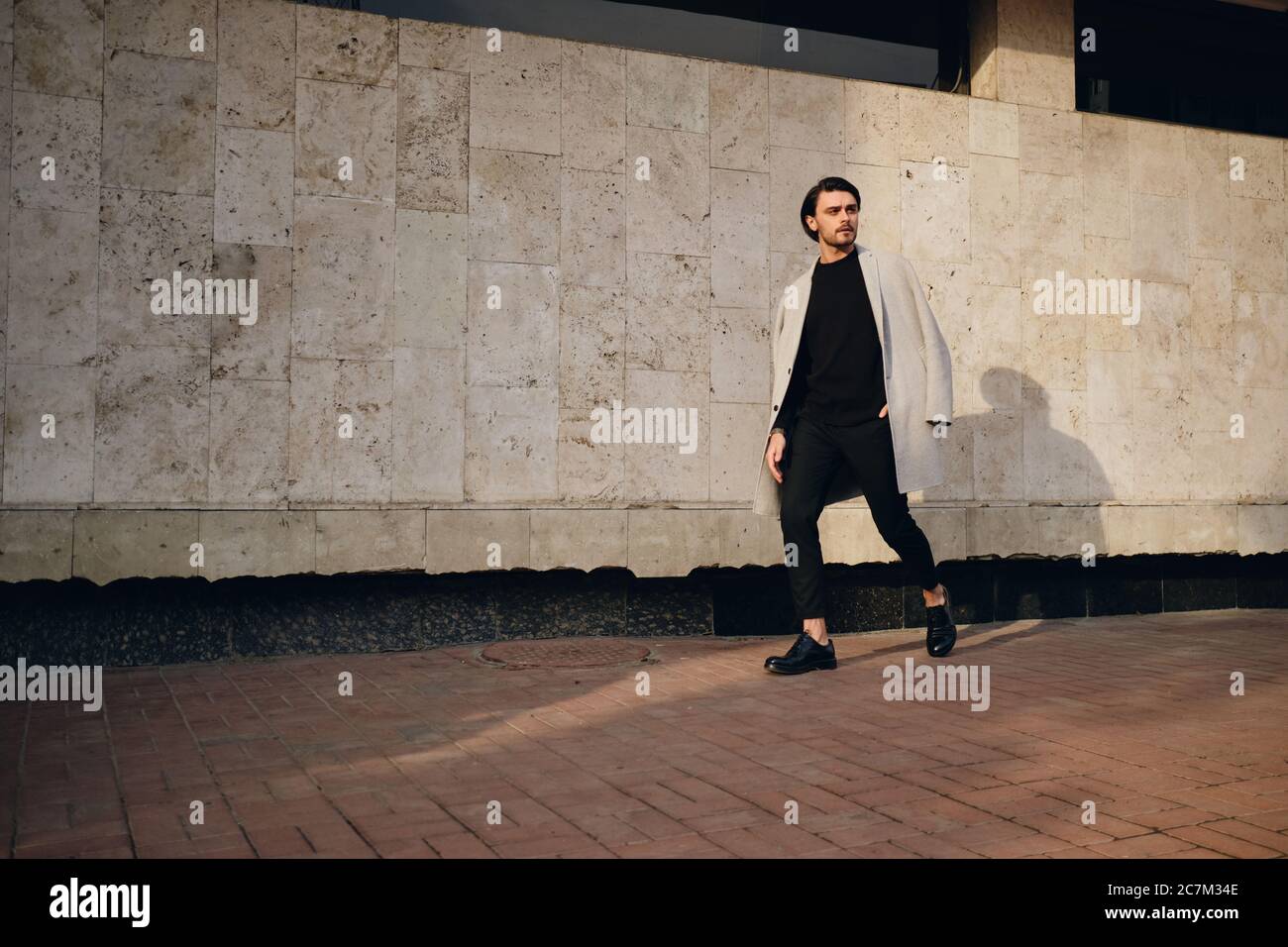 Man walking away street cool hi-res stock photography and images - Alamy