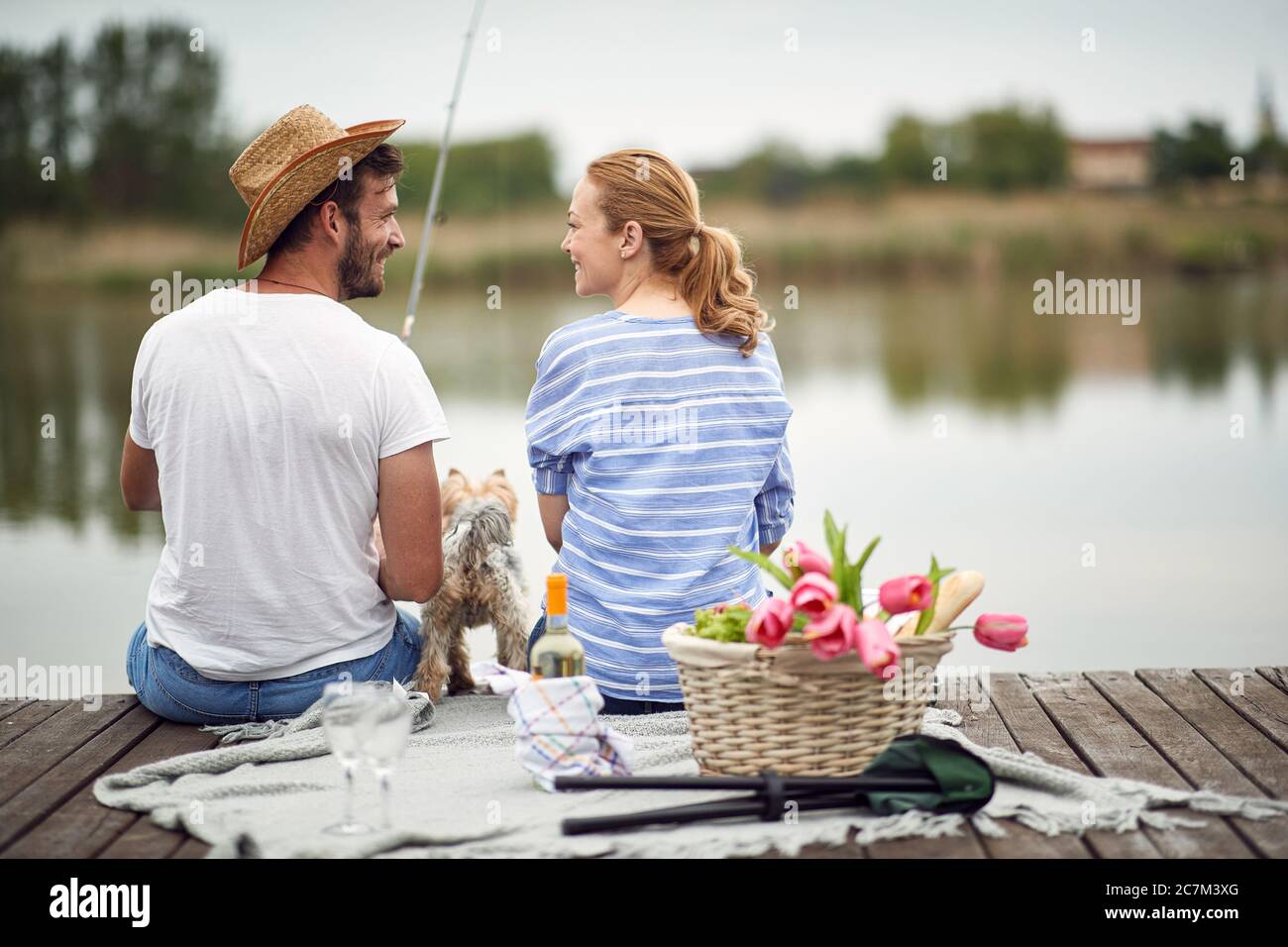 Young woman fishing pond in hi-res stock photography and images - Alamy